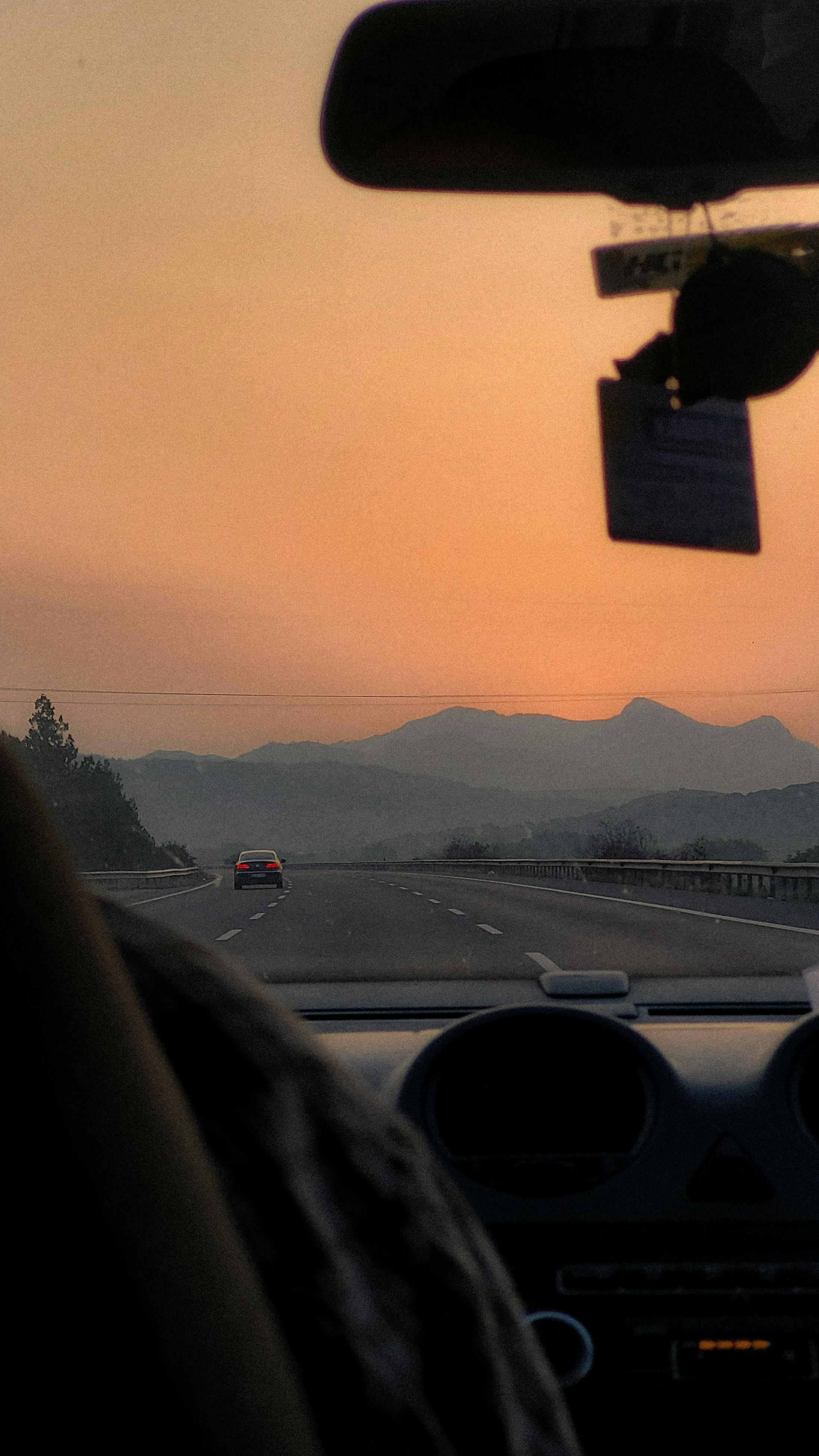 Road at Dawn Seen from Car · Free Stock Photo