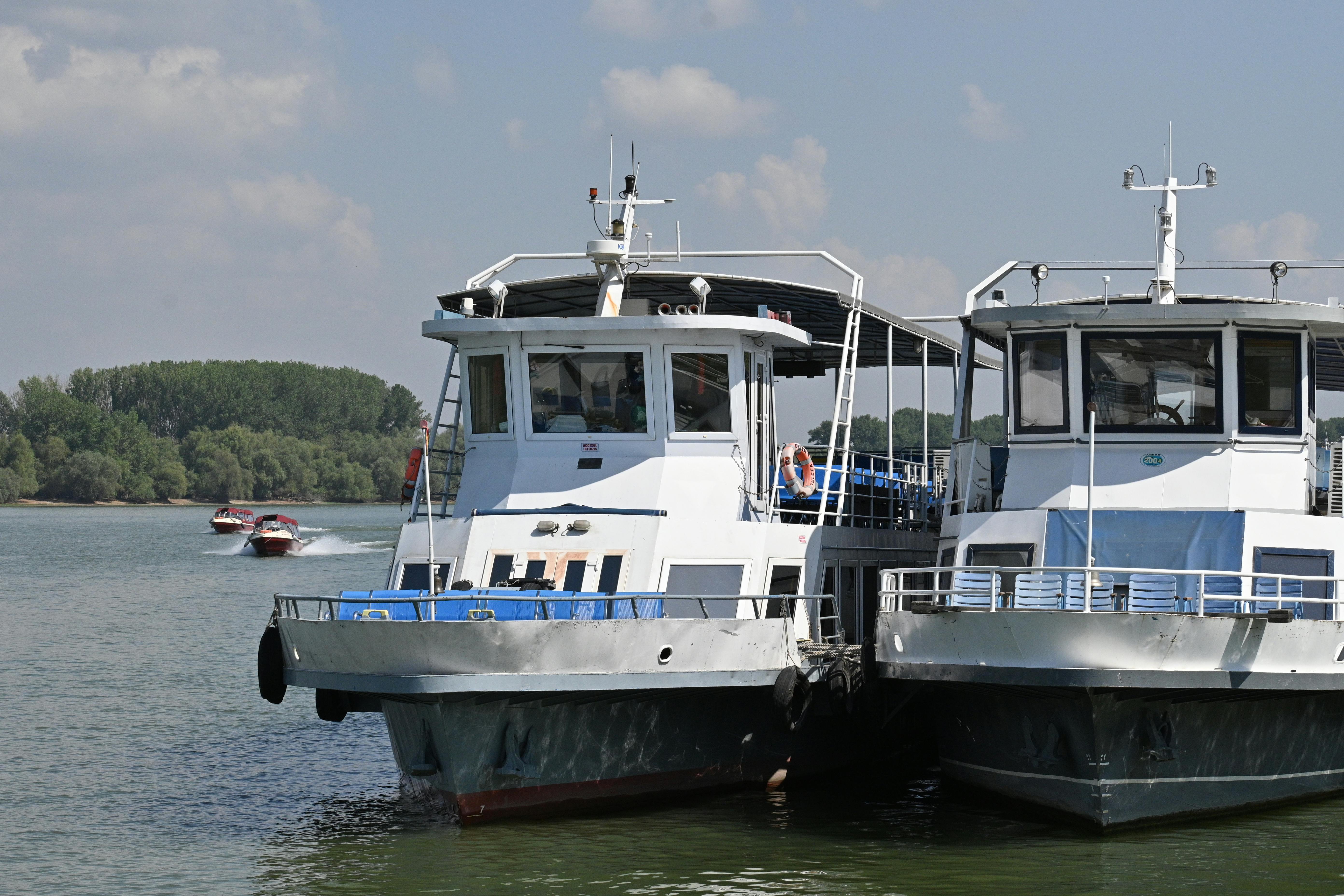 Moored Ferries on the River · Free Stock Photo