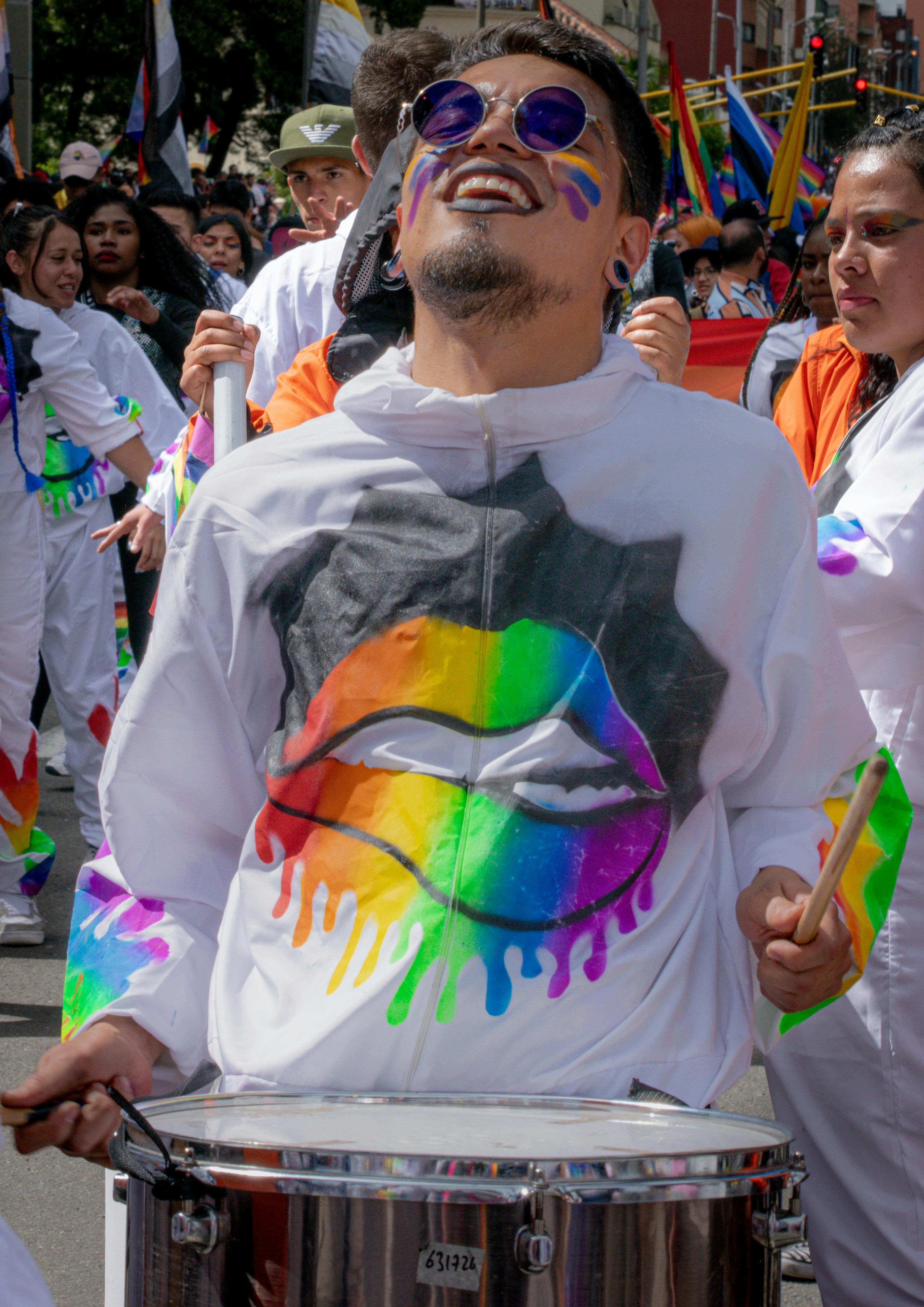 Man Playing Drum at Parade · Free Stock Photo