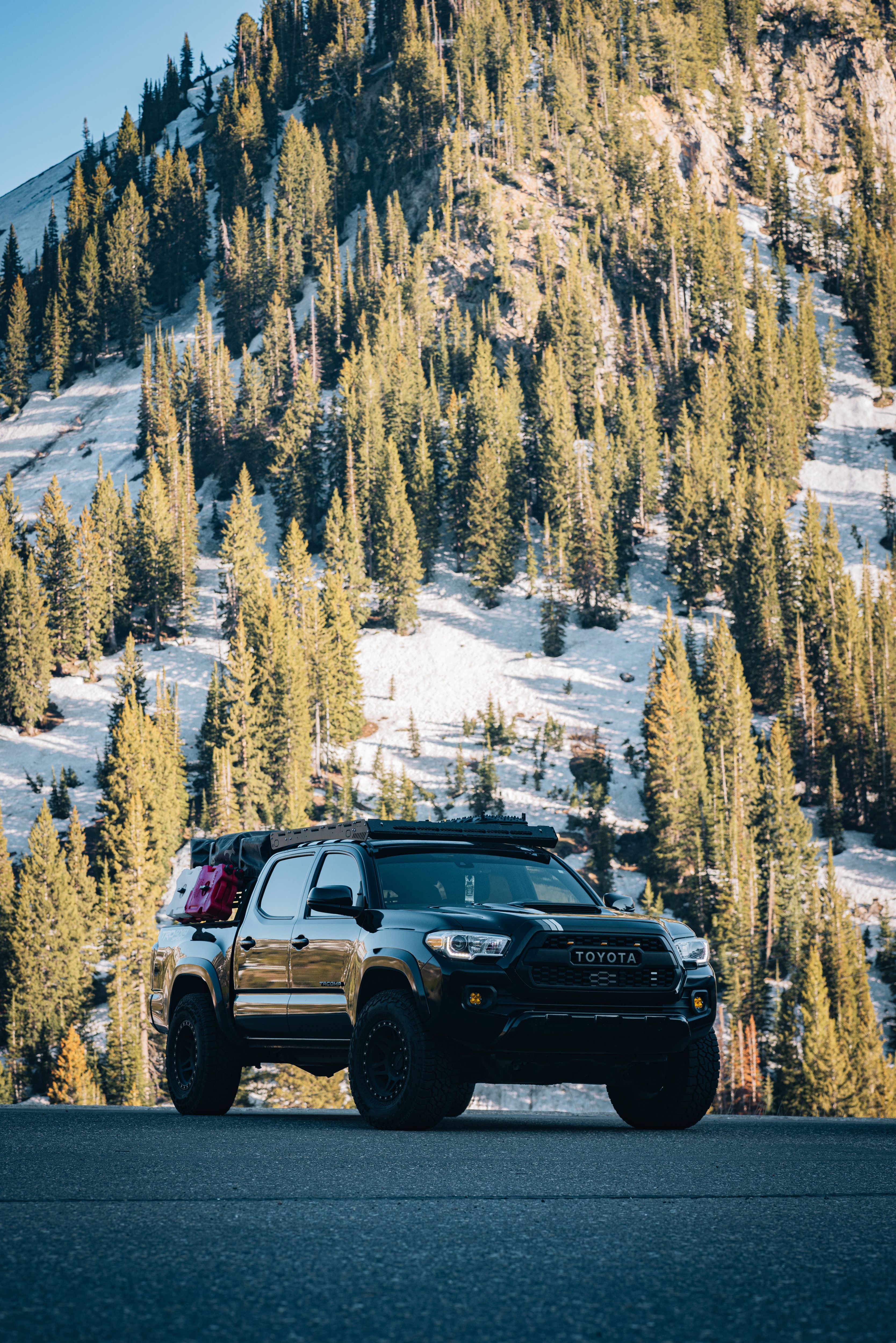 Black Off-Road Car Parked in front of a Snow-Covered Hill · Free Stock ...