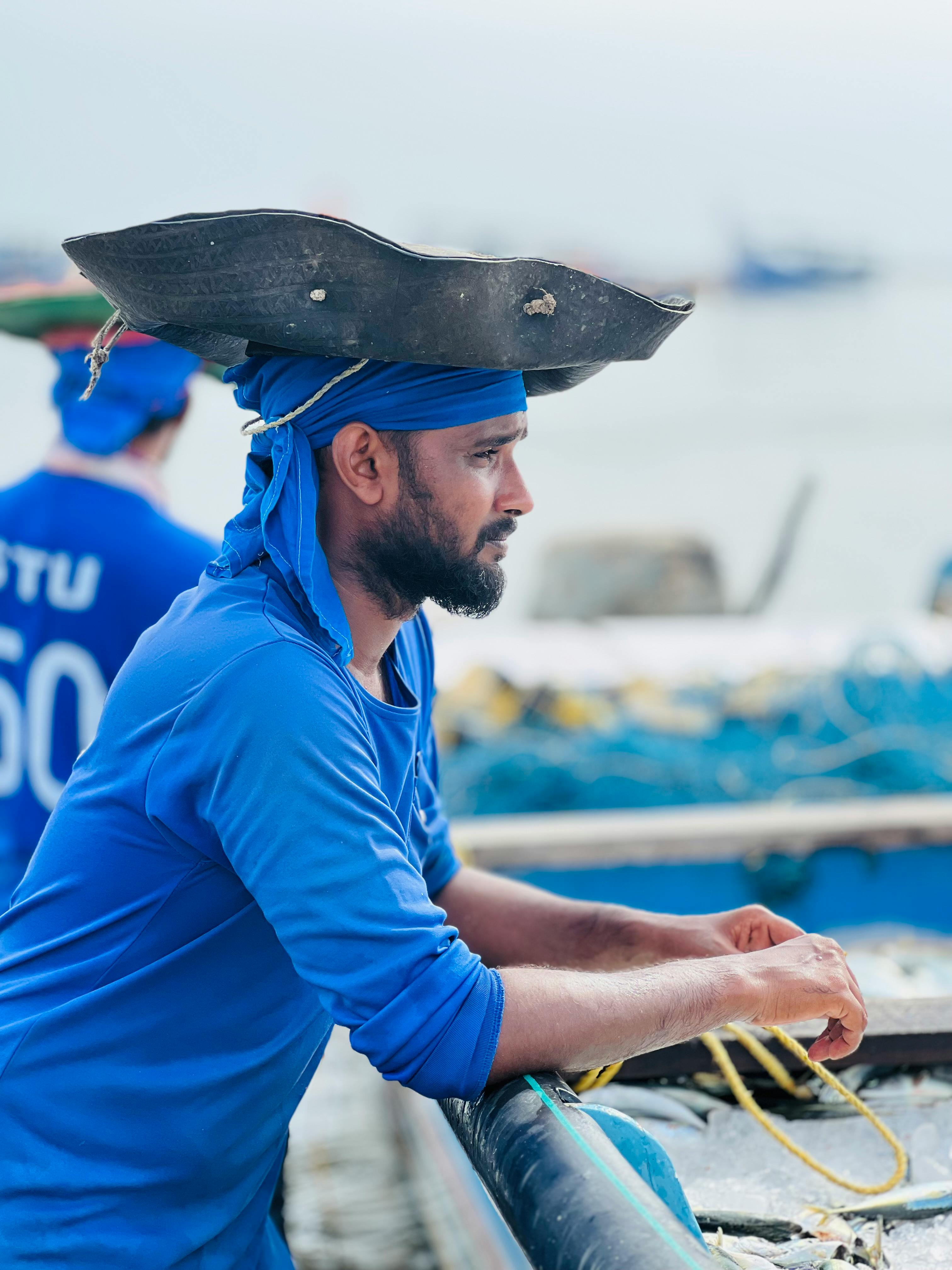 Man with a Pan on His Head · Free Stock Photo
