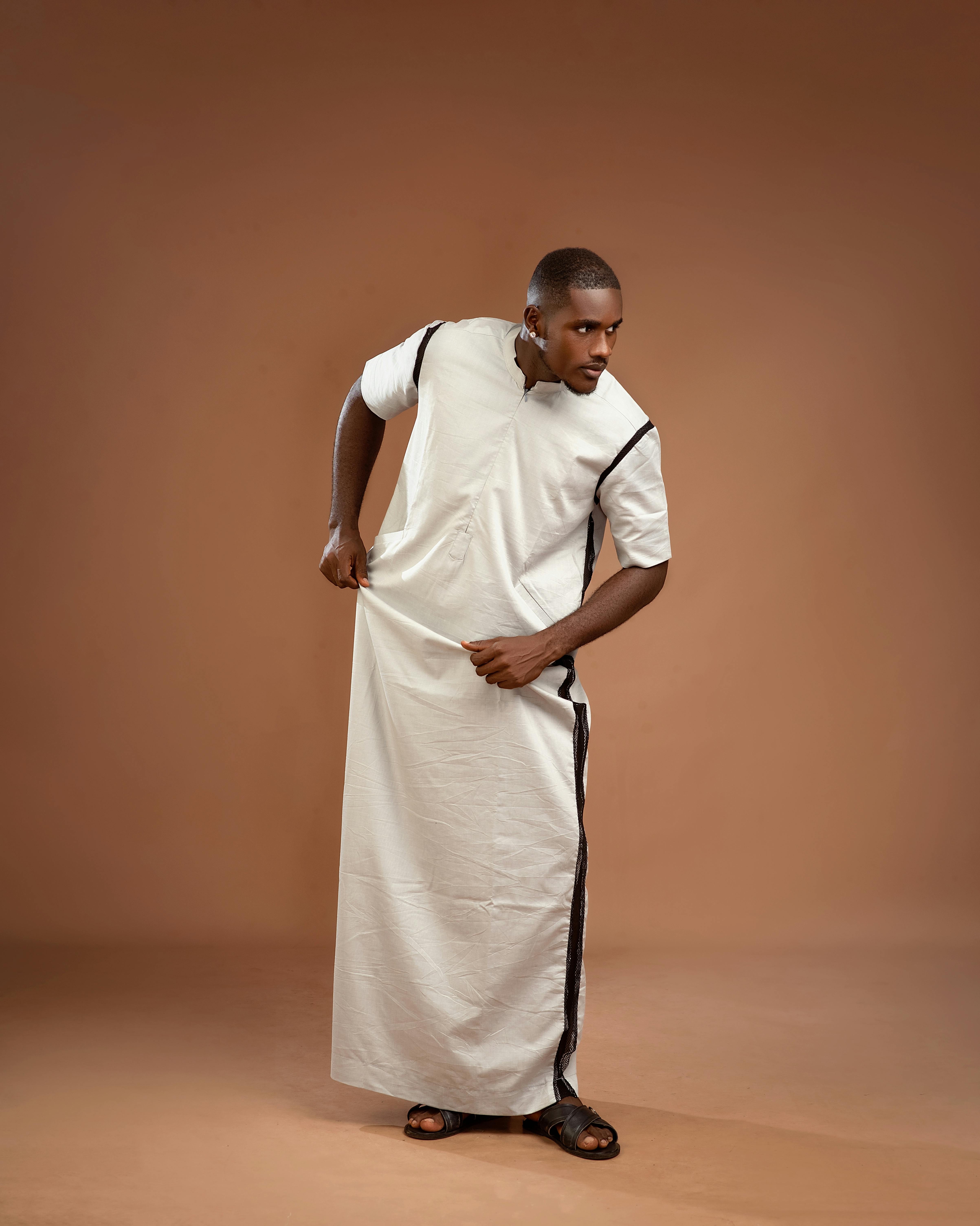 A Portrait of a Man Wearing Jalabiya · Free Stock Photo