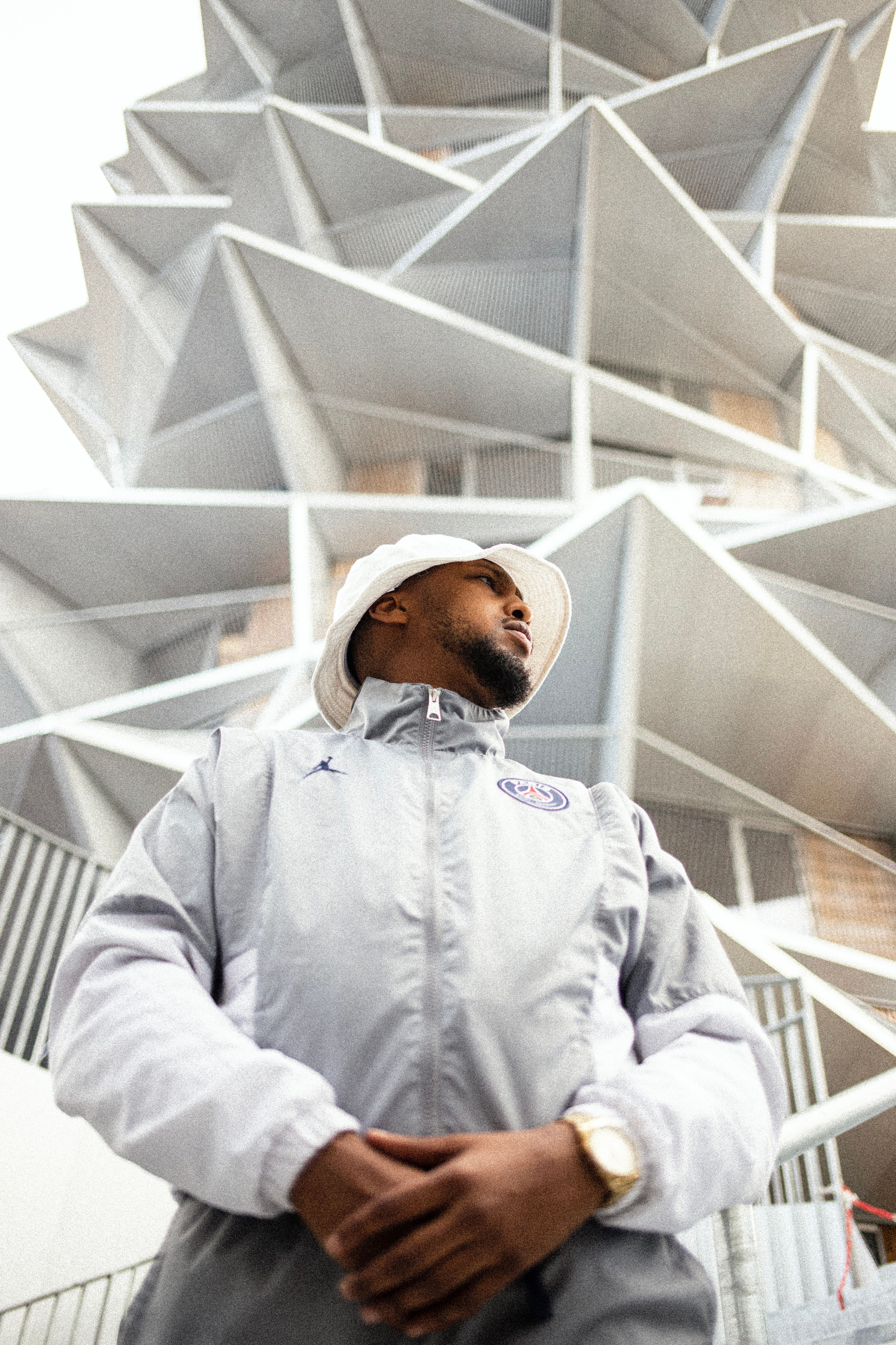 Man Wearing a Bucket Hat and a Jacket · Free Stock Photo