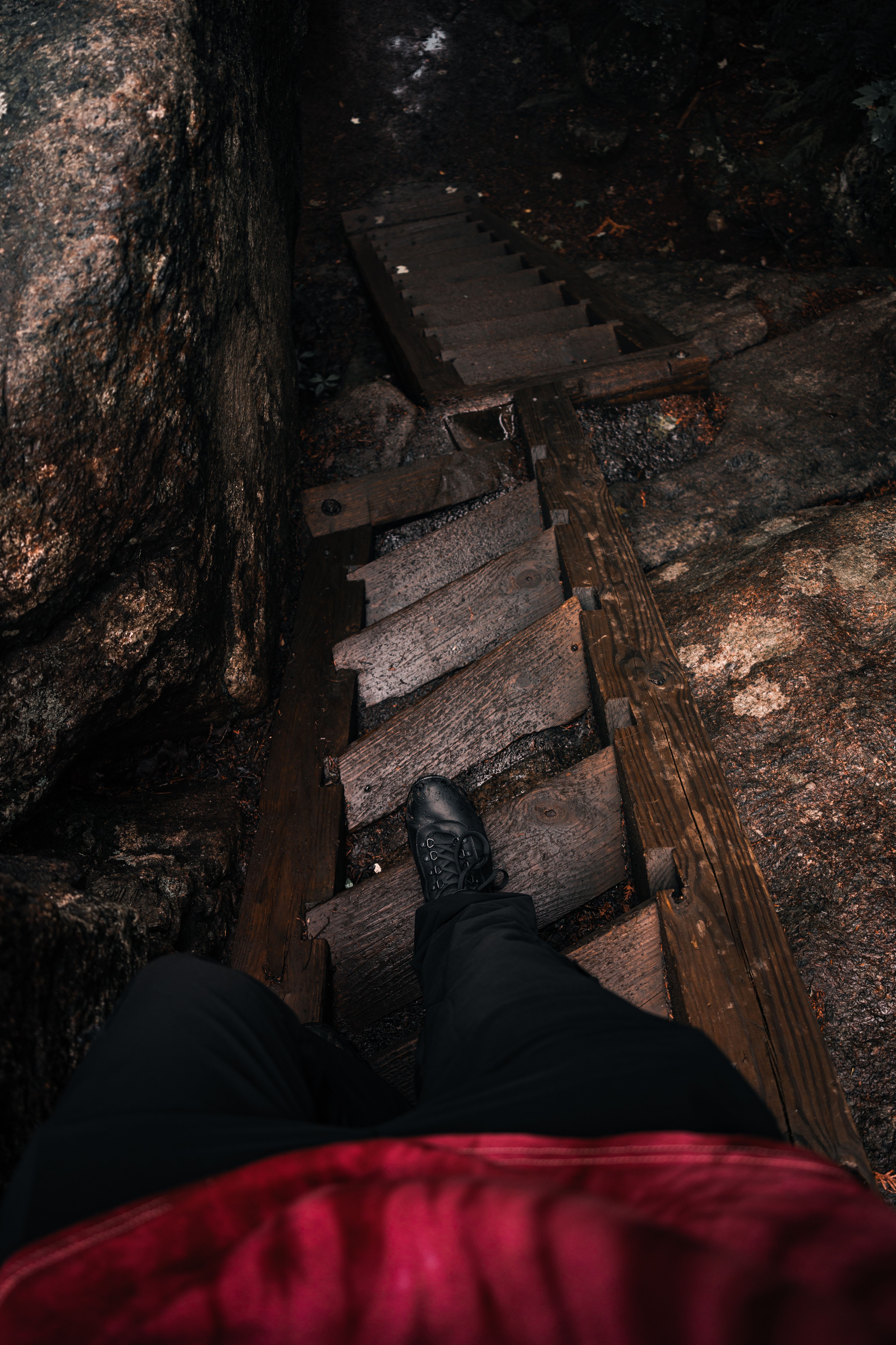Legs of a Person Walking Down a Narrow Set of Steep Wooden Steps · Free ...