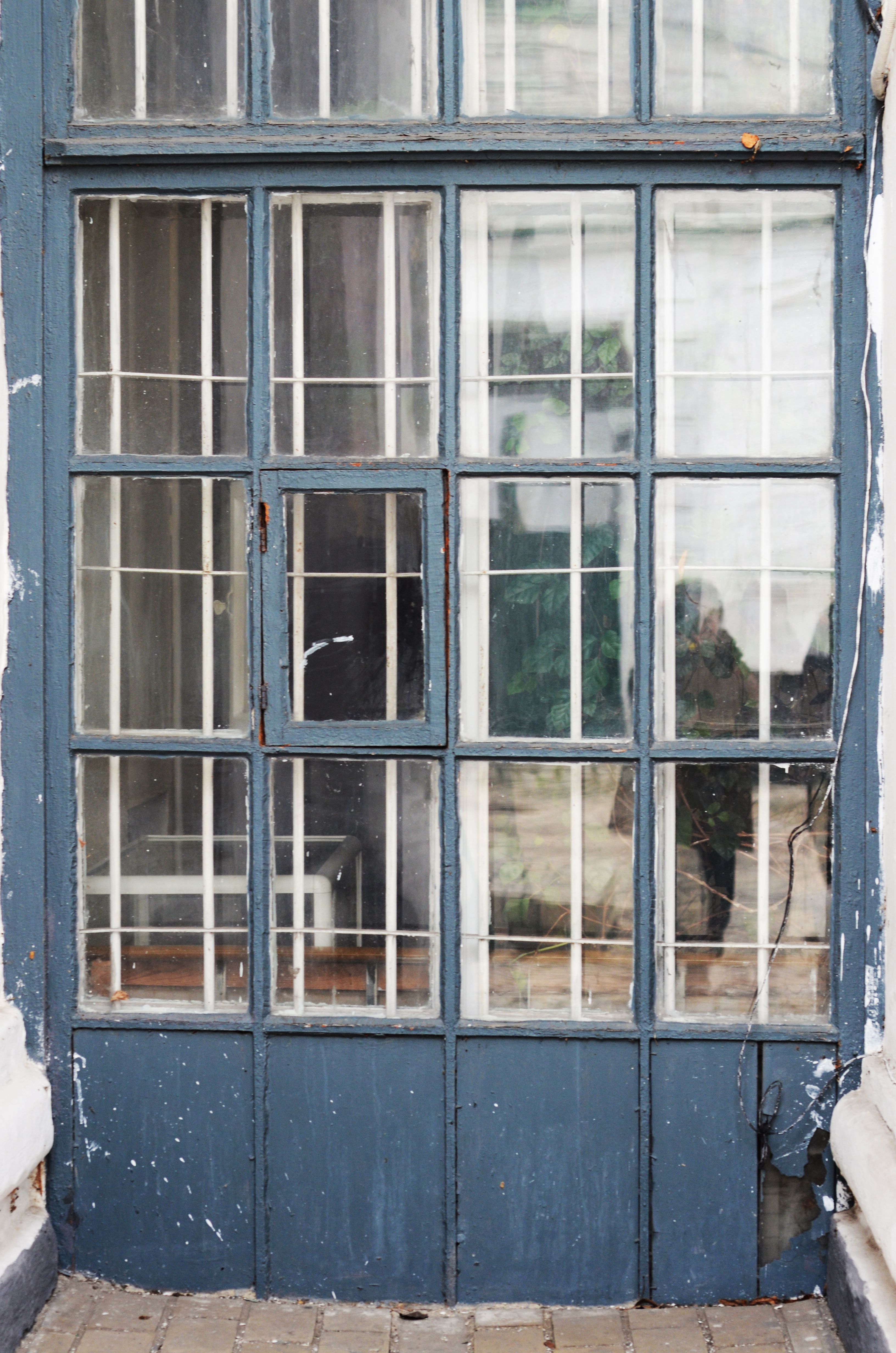 Windows in Damaged, Blue Wall · Free Stock Photo