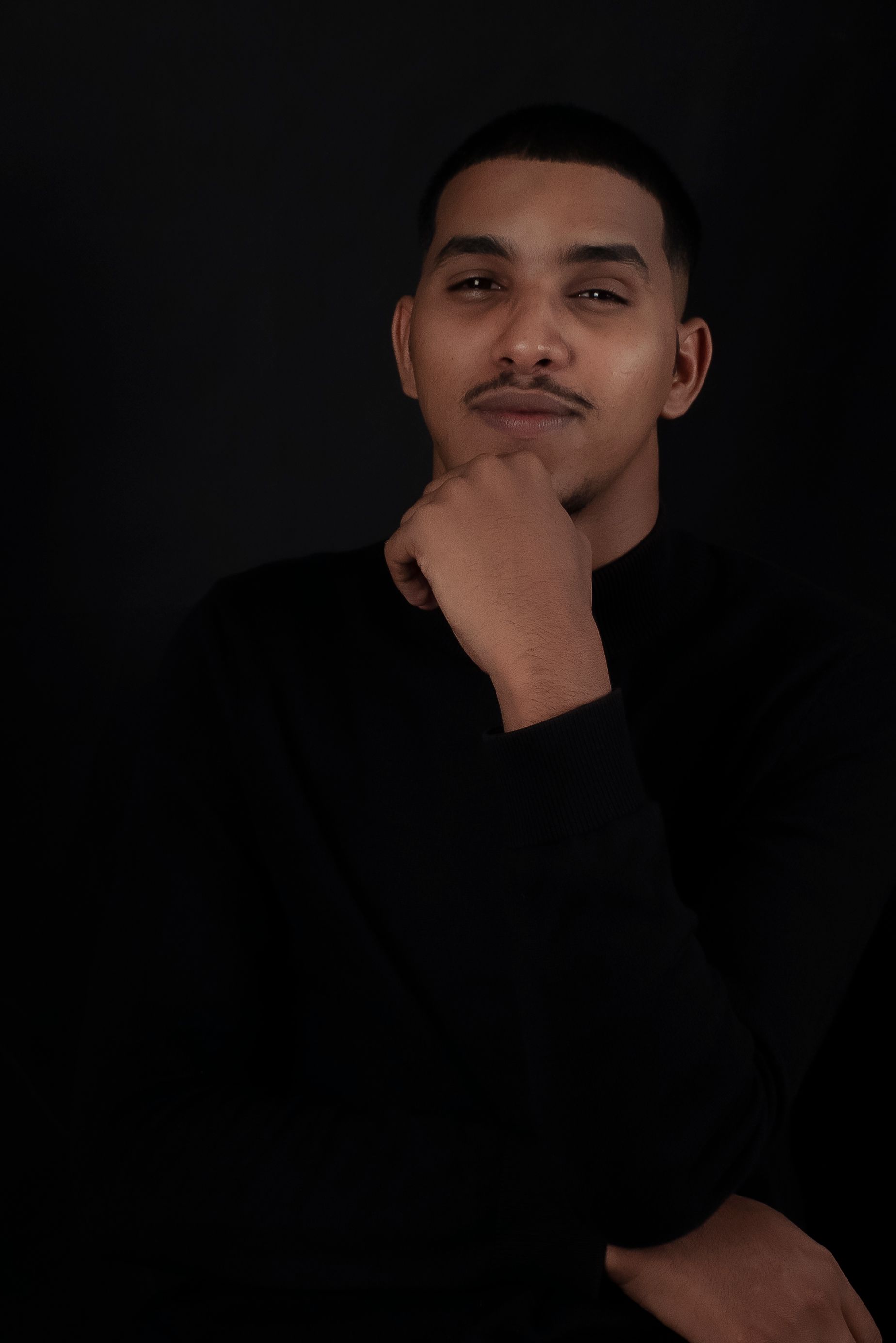 Portrait of a Man in Dark Background · Free Stock Photo