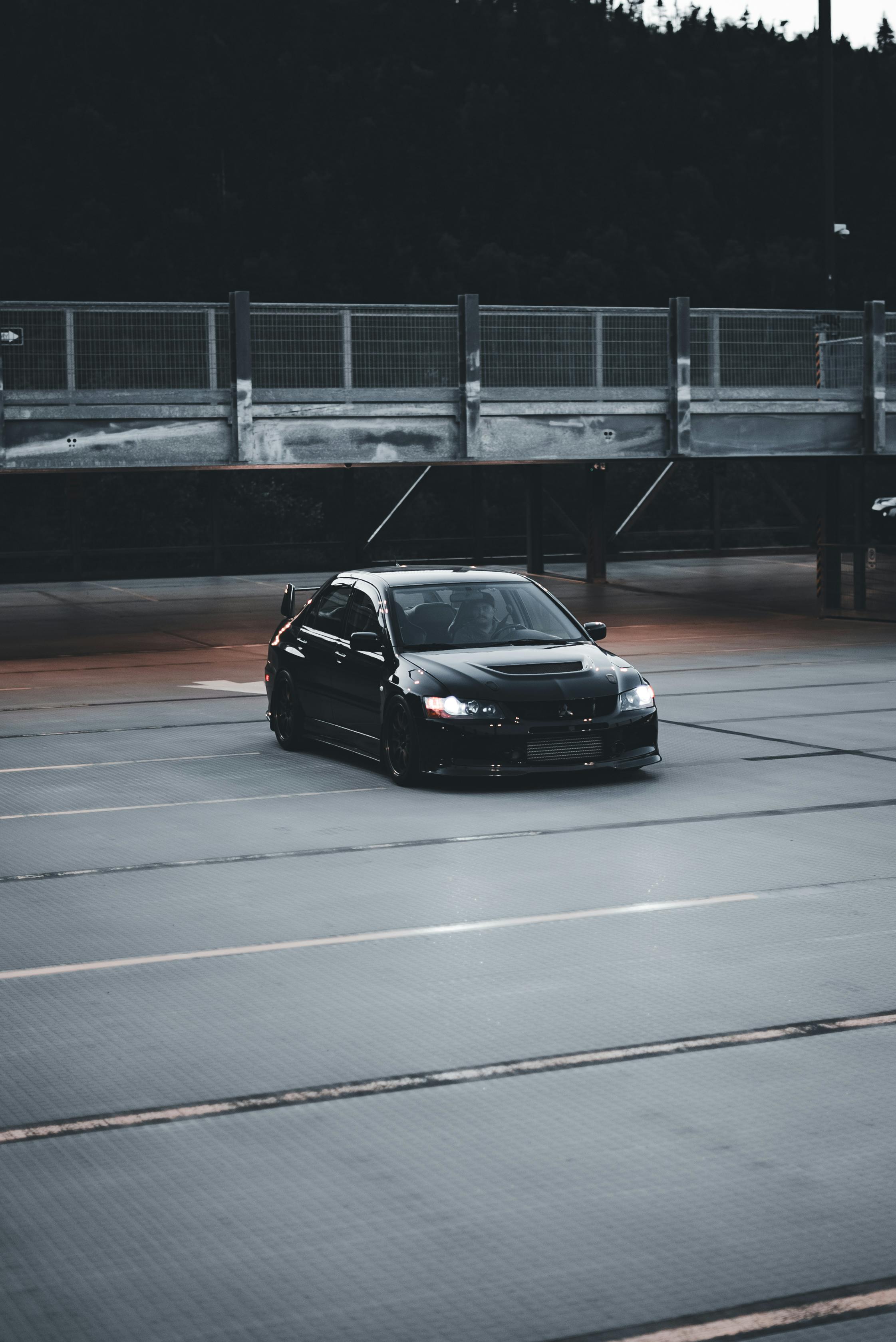 Black, Tuned Mitsubishi Lancer Evolution · Free Stock Photo