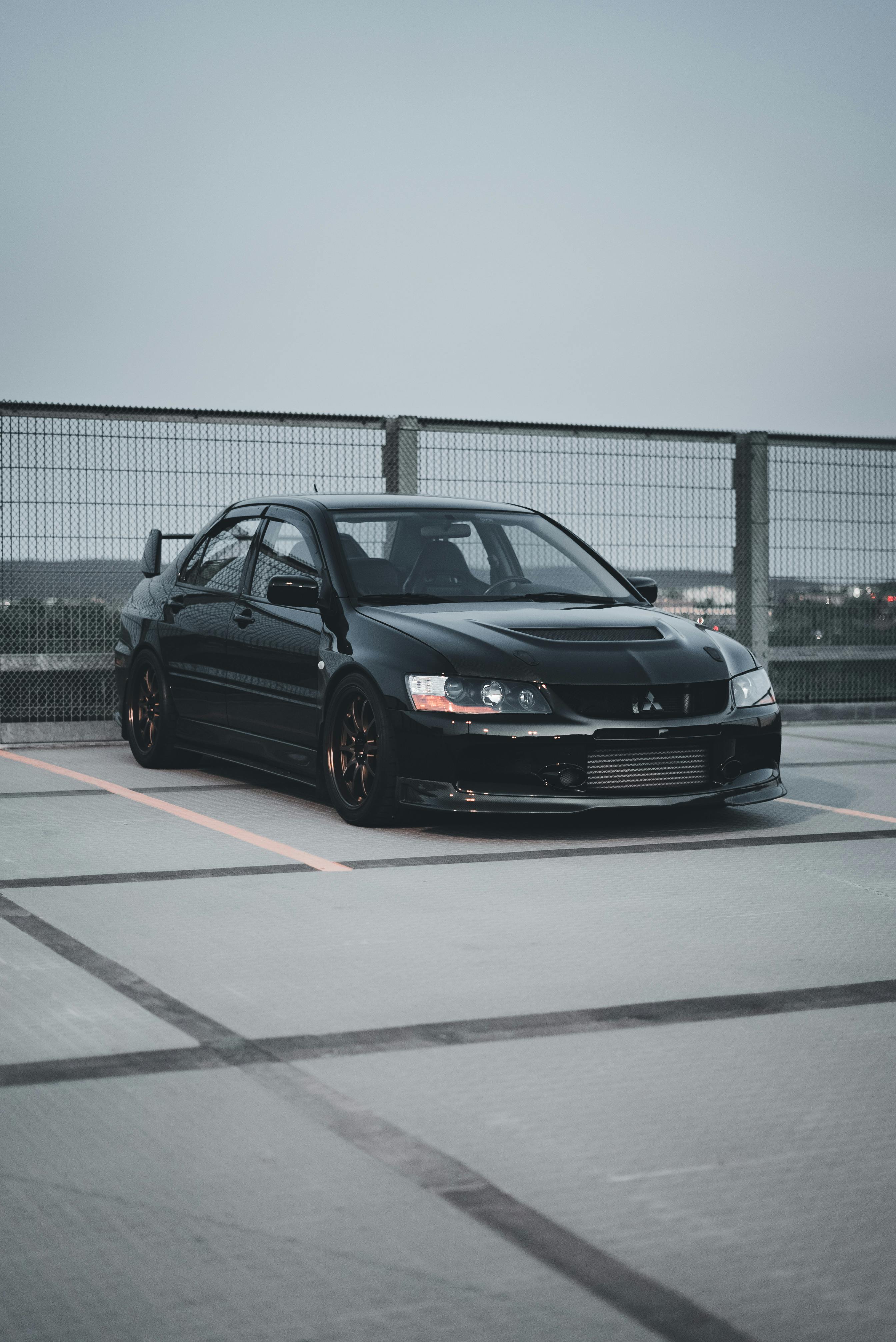 Parked Mitsubishi Lancer Evolution · Free Stock Photo