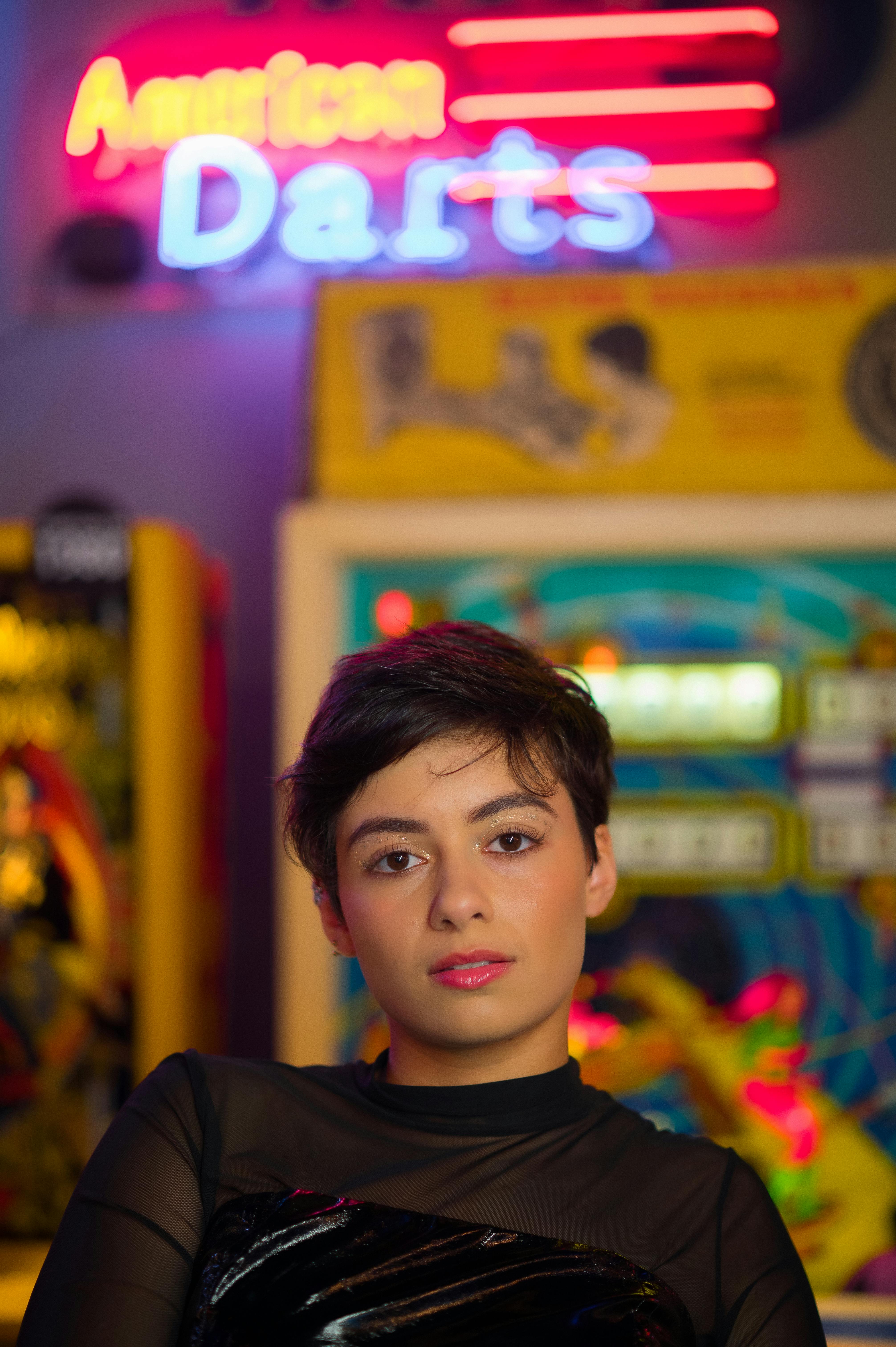 Picture of a Young Woman at the Arcade · Free Stock Photo