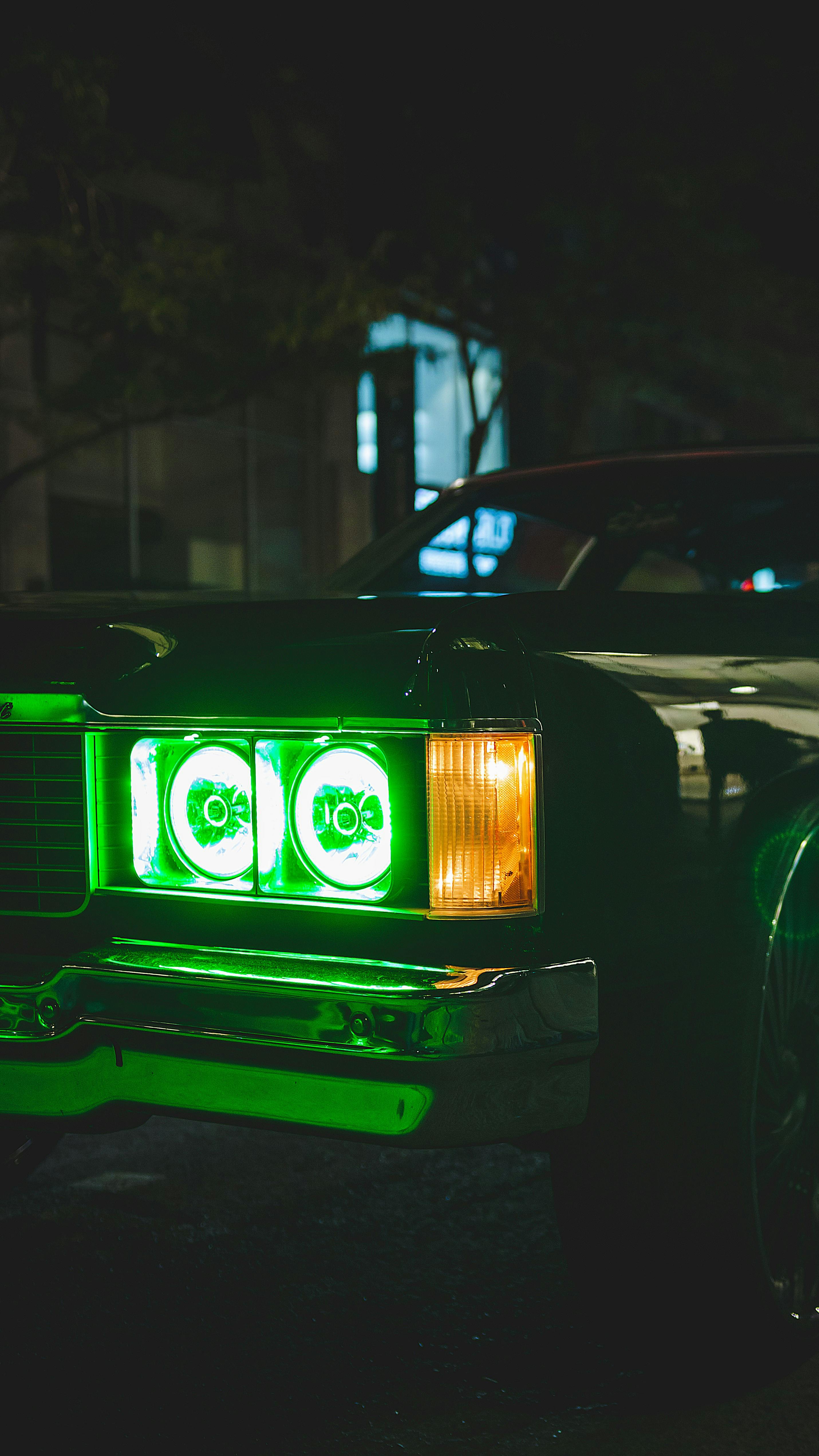 Green Headlight Light of Car at Night · Free Stock Photo