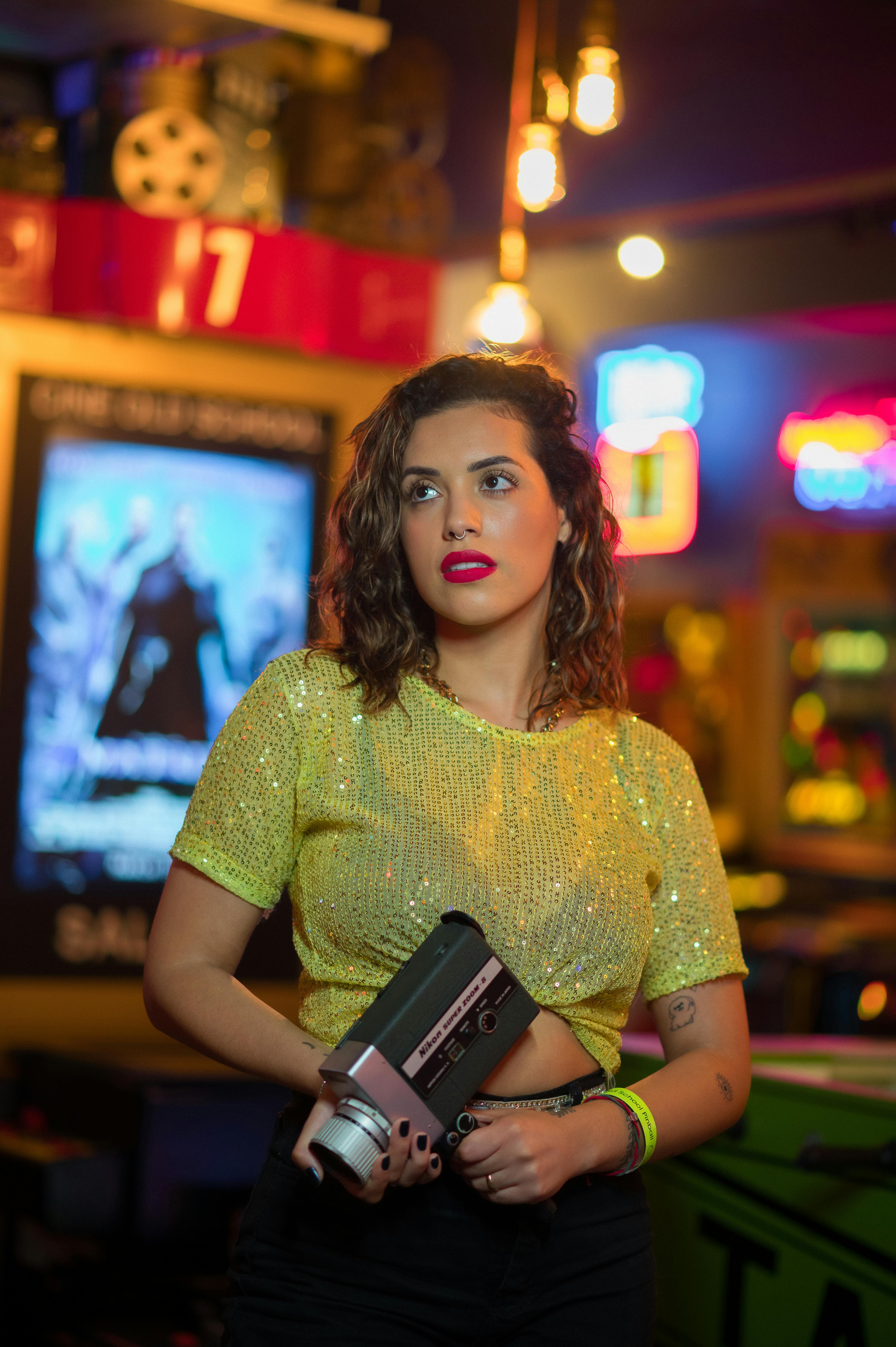 Picture of a Young Woman at the Arcade · Free Stock Photo