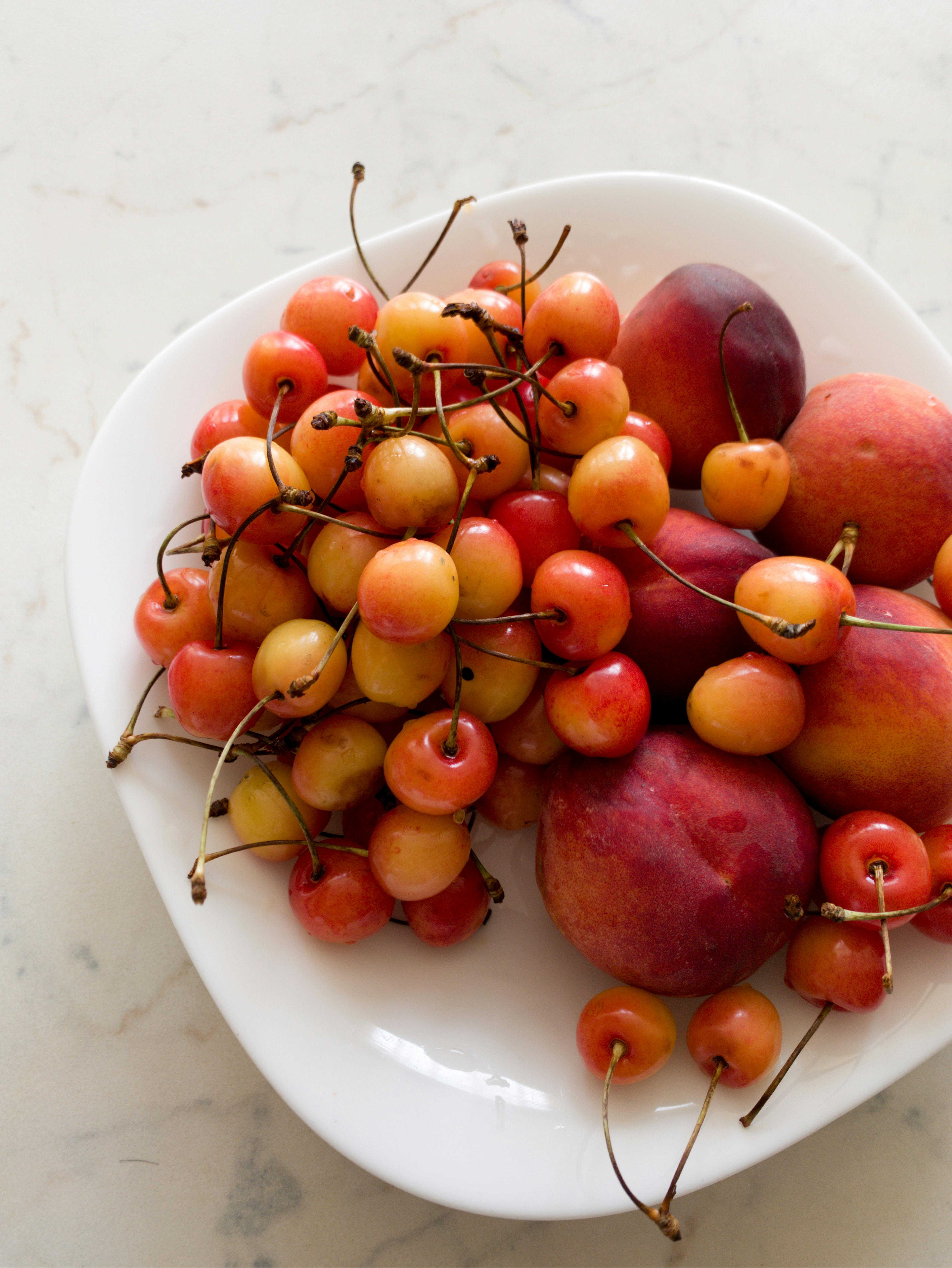 Close Up Photography of a Red Cherry Fruit · Free Stock Photo