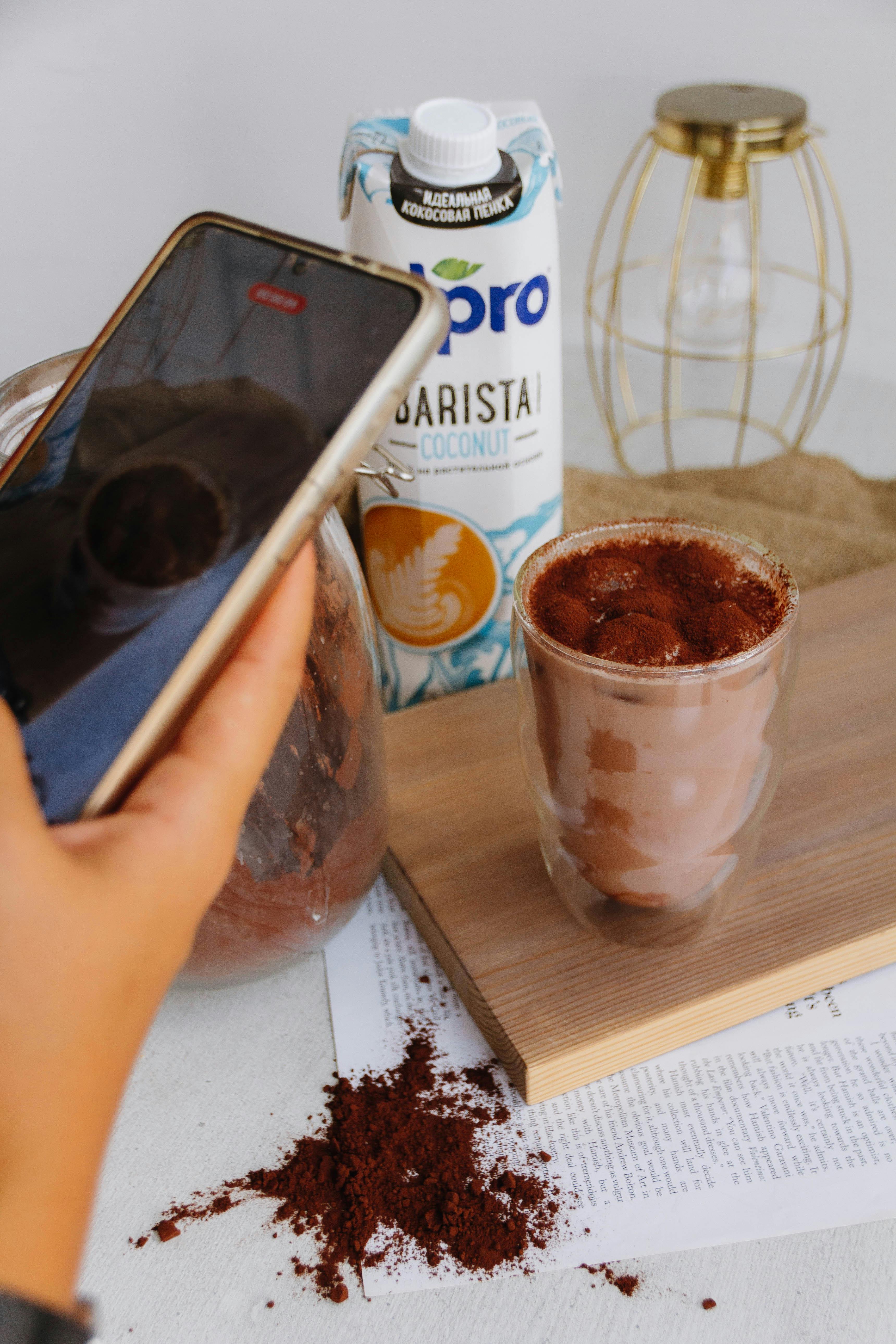 Person Photographing a Cold Coconut Milk and Coffee Drink Preparation ...