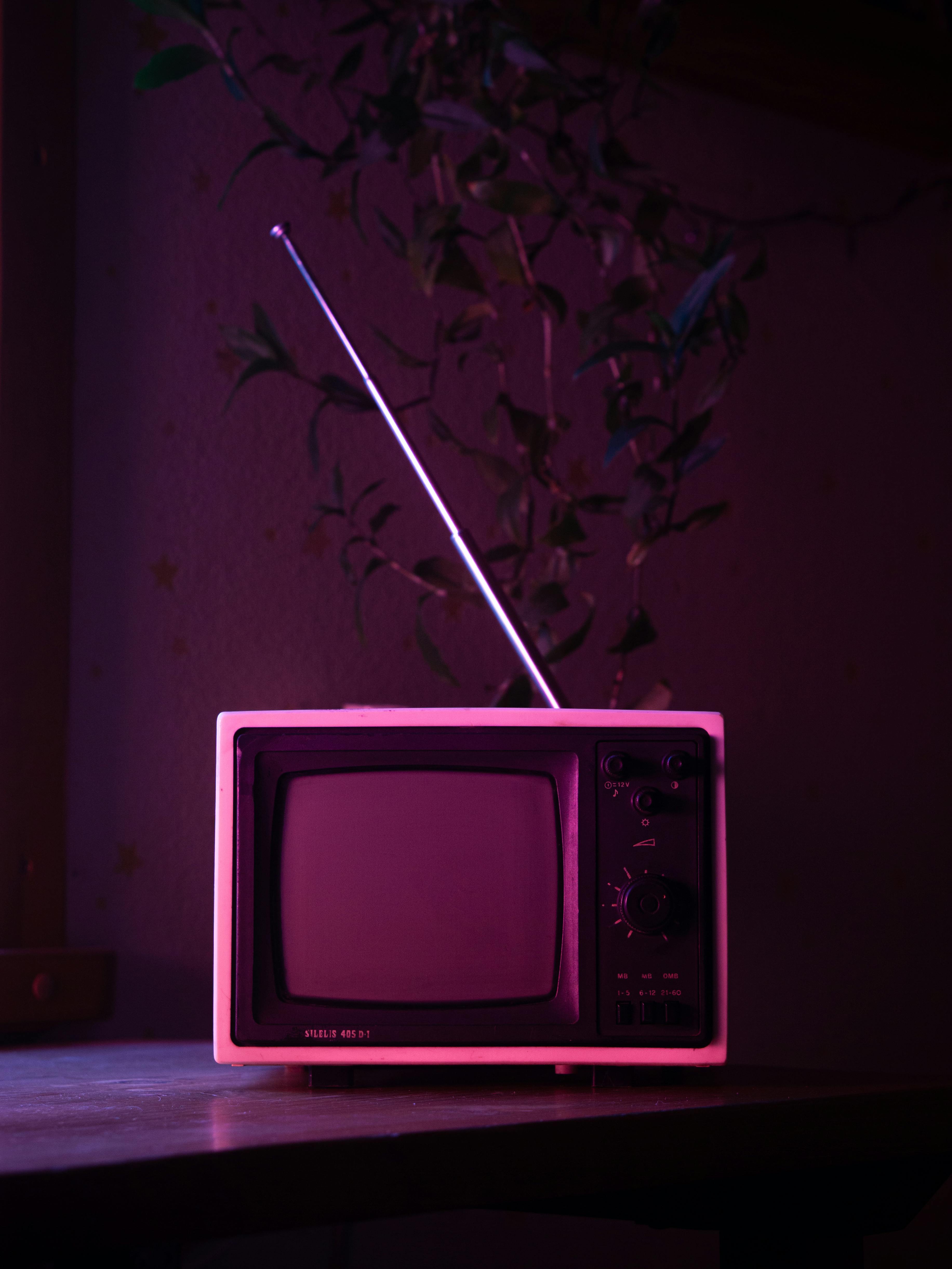 Pink Light over Vintage TV · Free Stock Photo