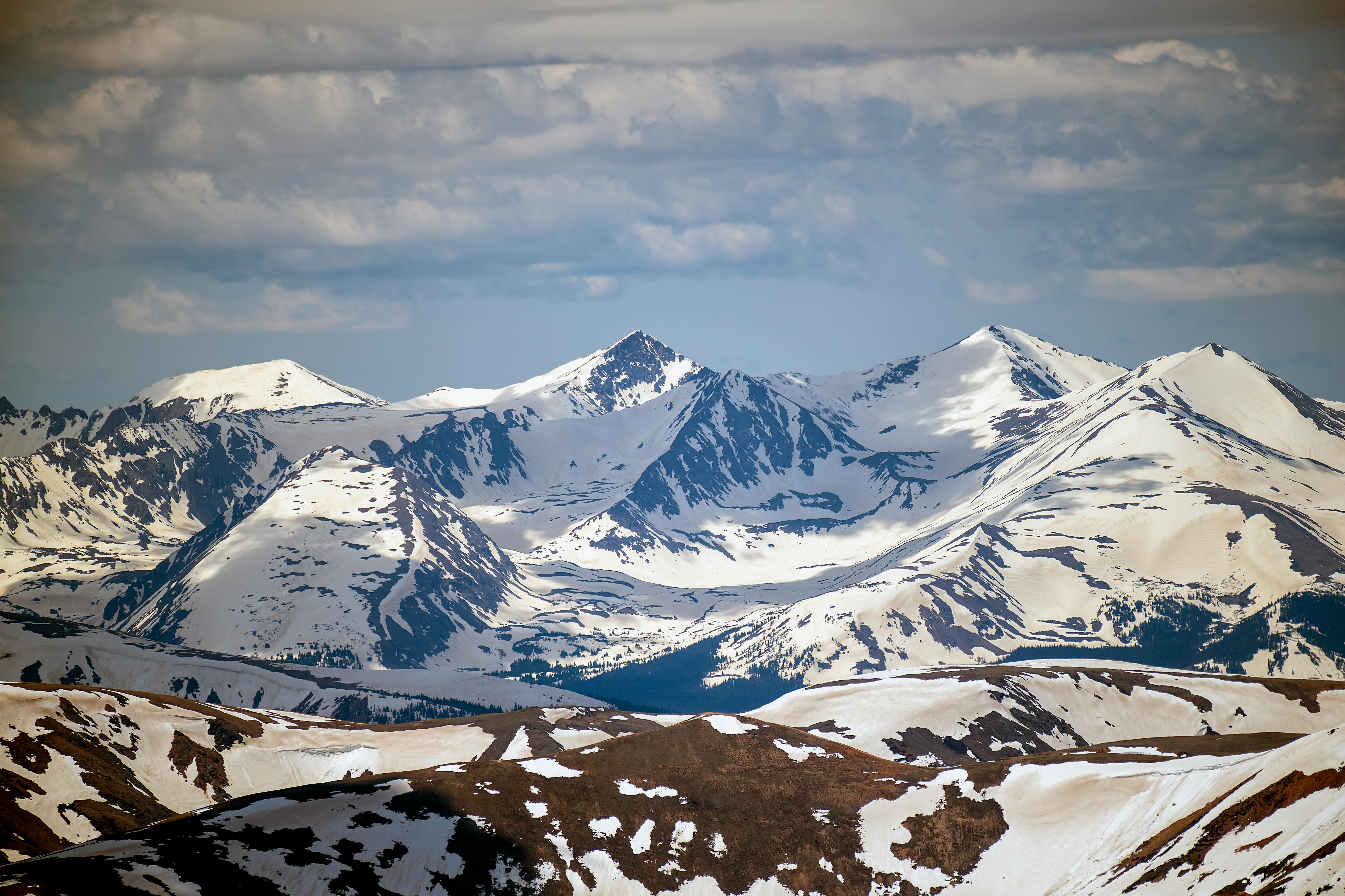 Green Trees Near Mountain Under White Clouds during Noontime · Free ...