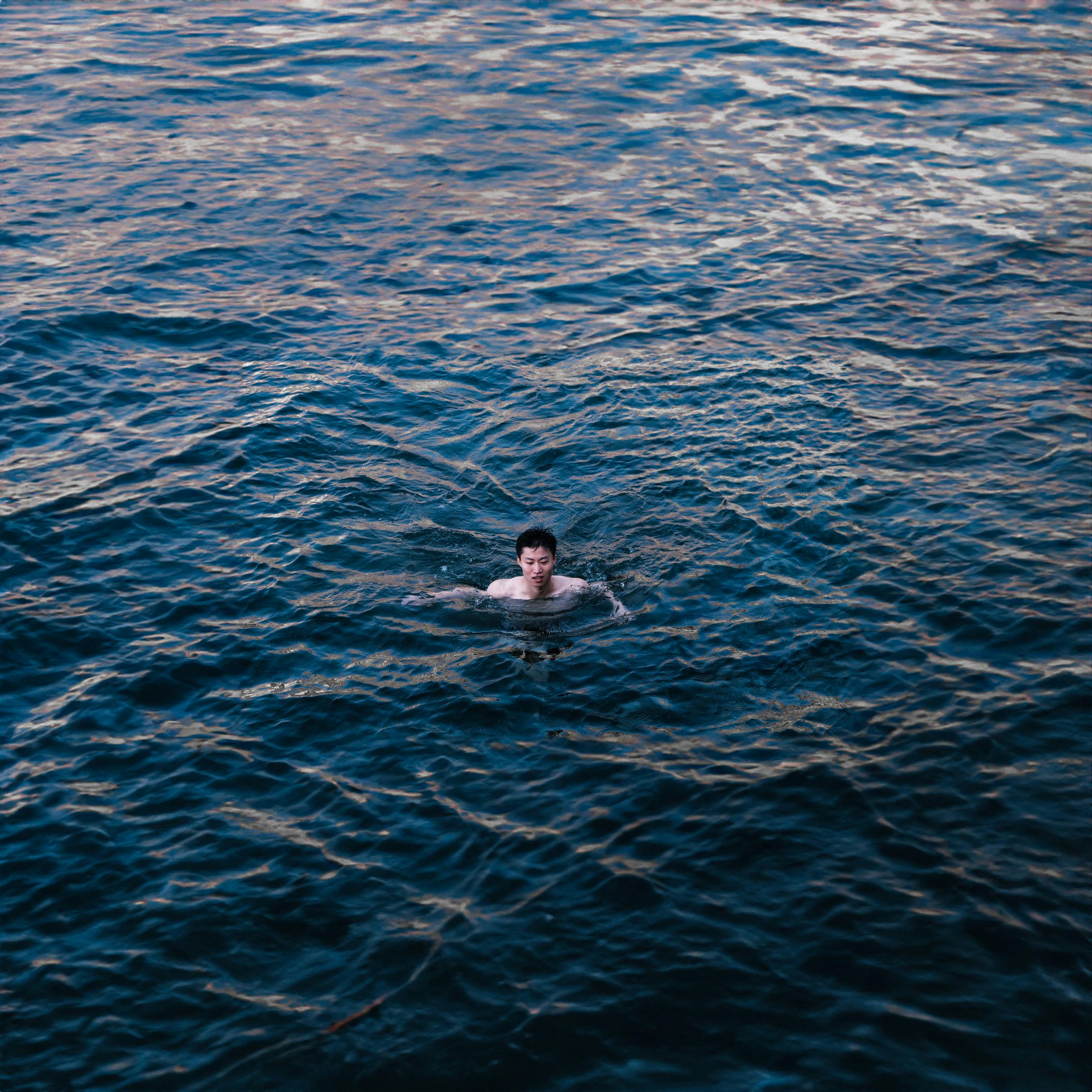 Man Swimming in Water · Free Stock Photo