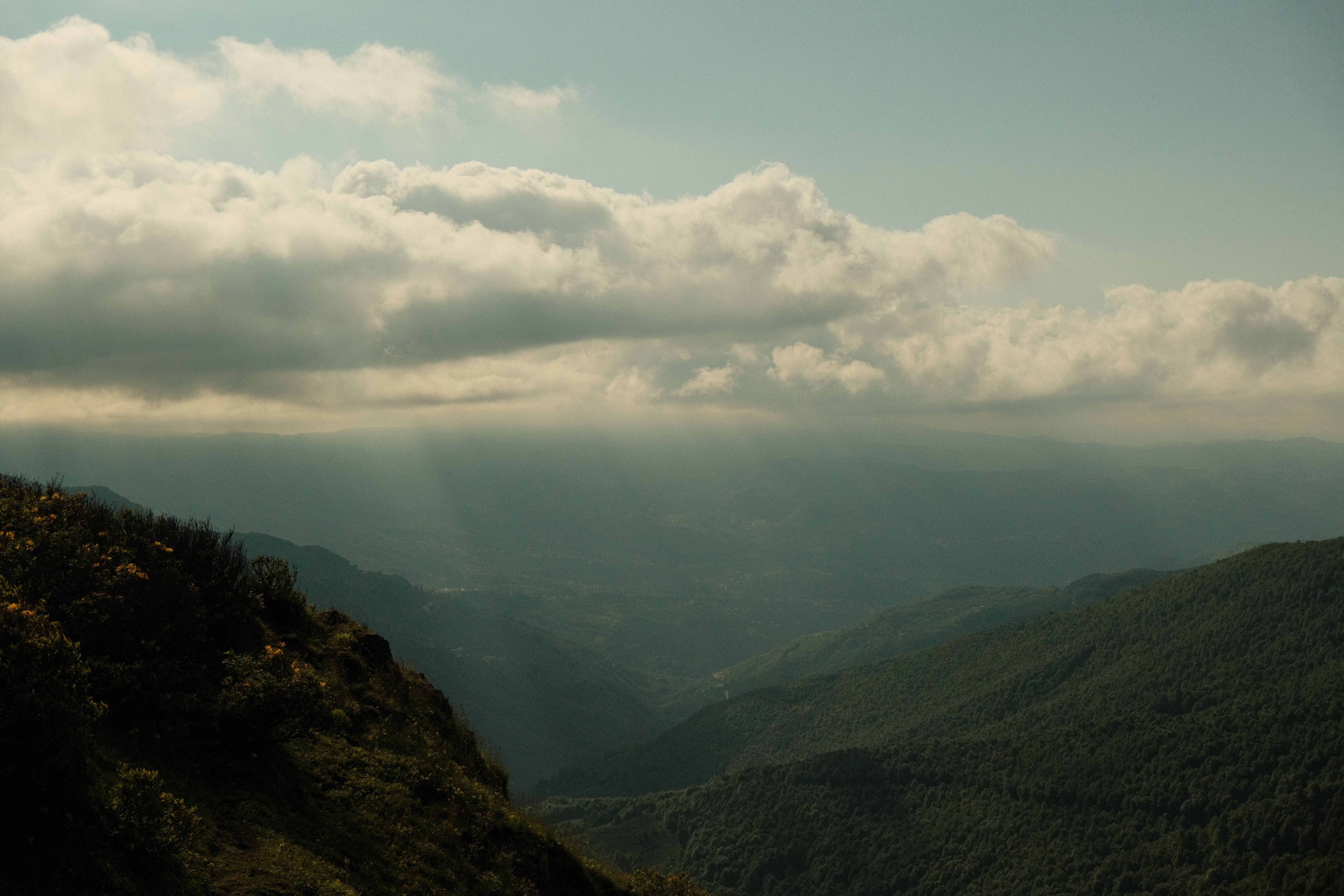 View of Mountains and the Valley from a Mountain Peak · Free Stock Photo