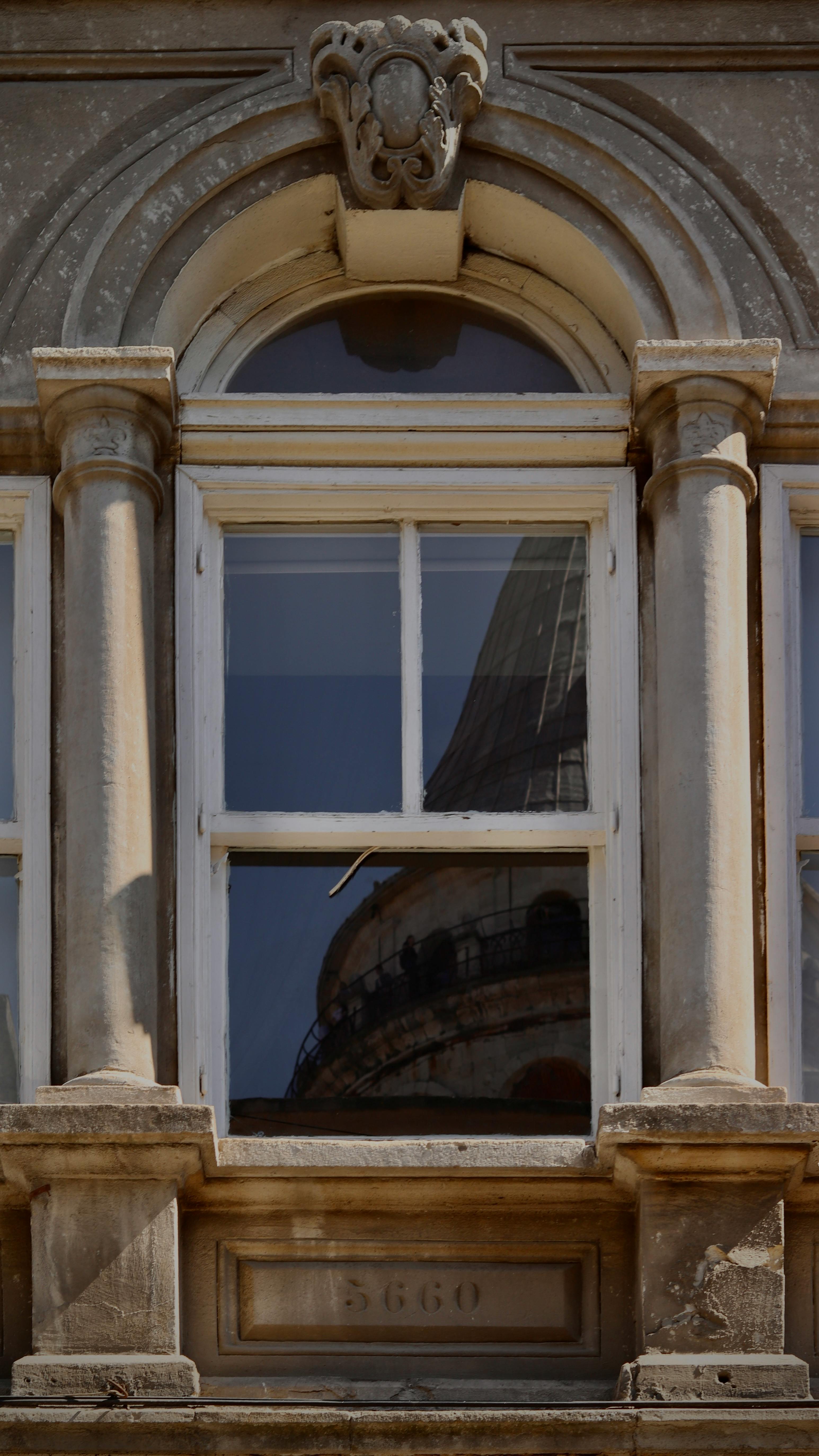 Reliefs over Arch with Columns · Free Stock Photo