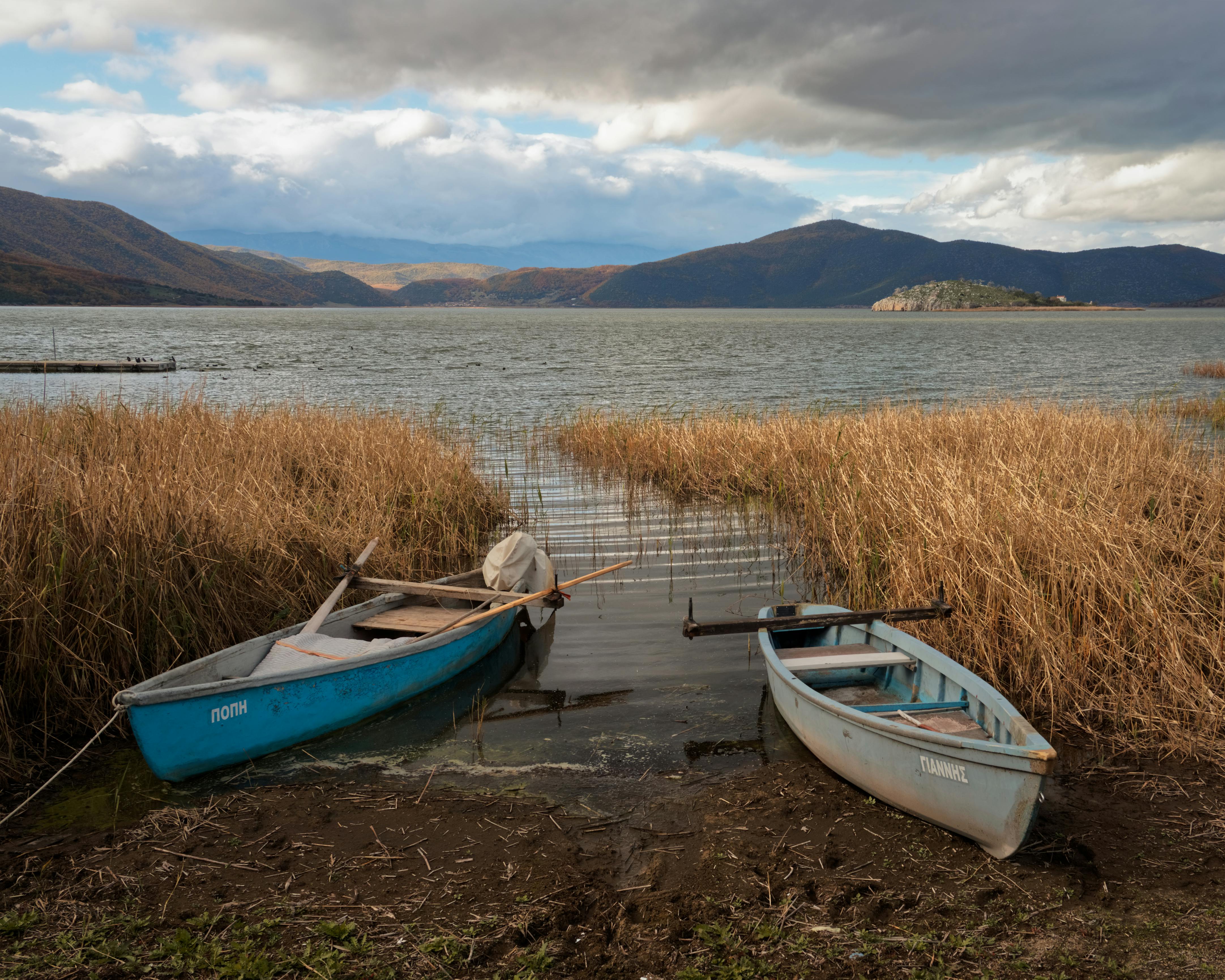 Clear Sky over Small Empty Boat on Lake · Free Stock Photo