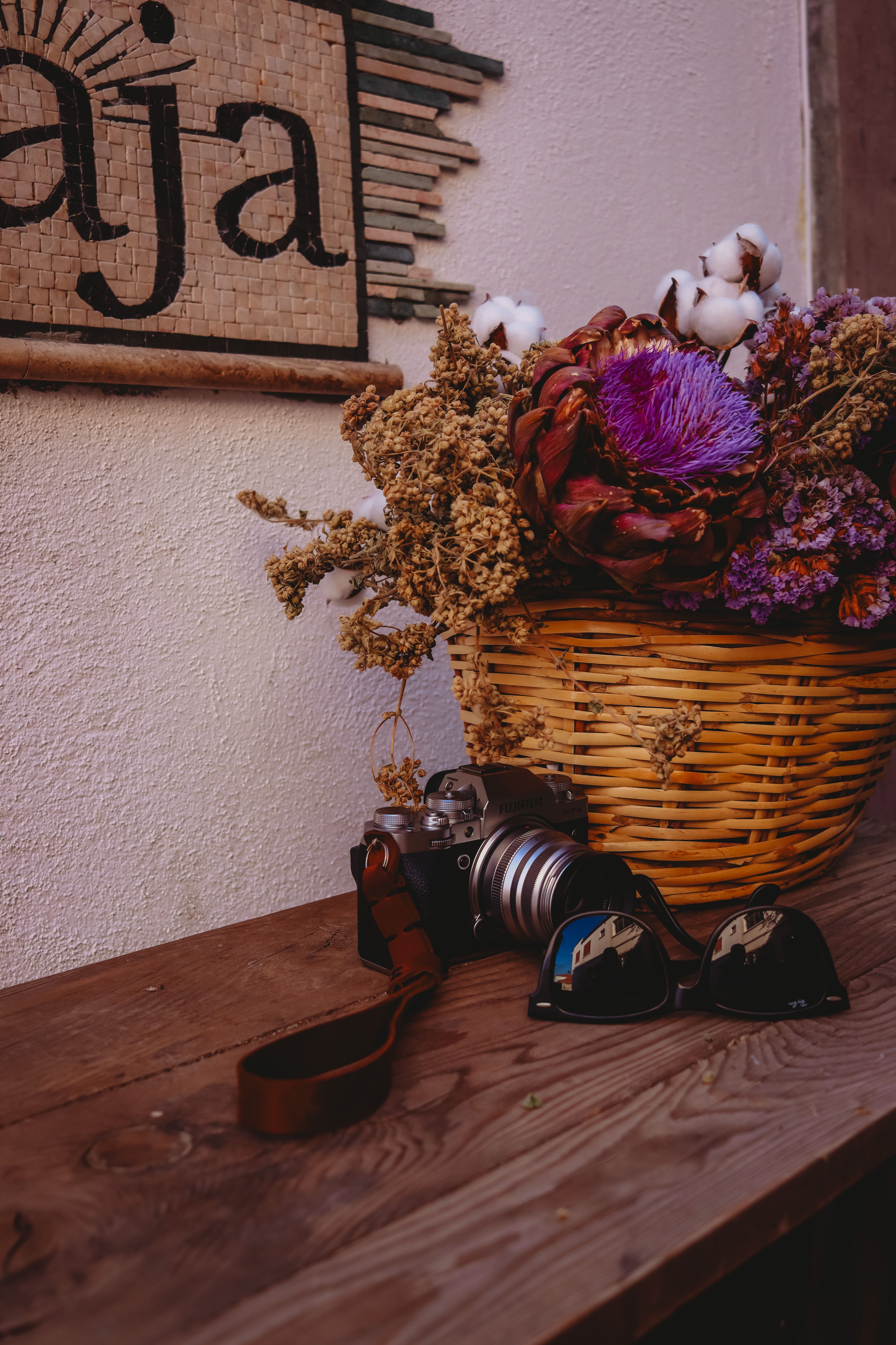 Bunch of Flower, Camera and Sunglasse on Wooden Shelf · Free Stock Photo