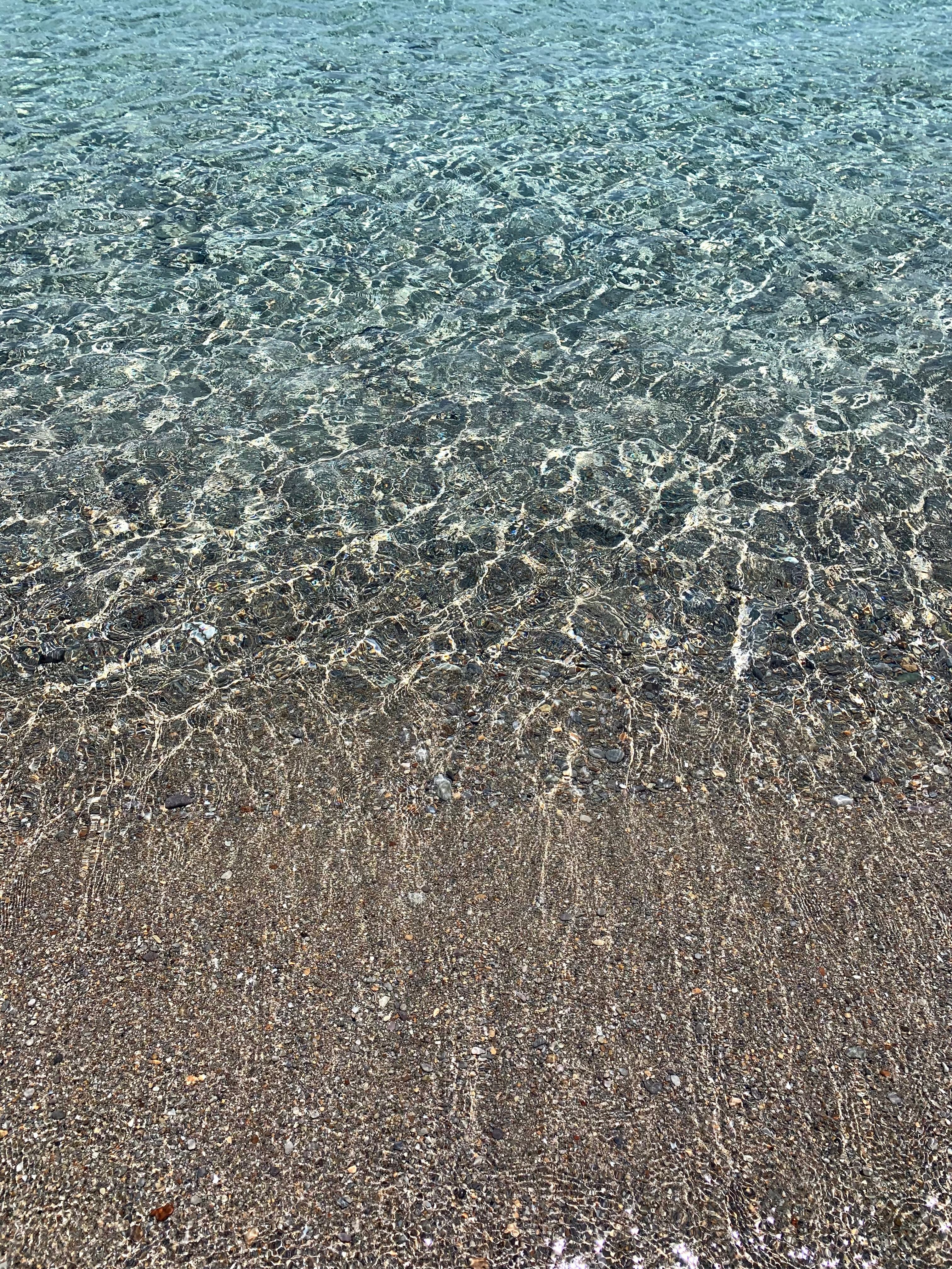 Sunlight Shining on Wrinkled Sea Surface · Free Stock Photo