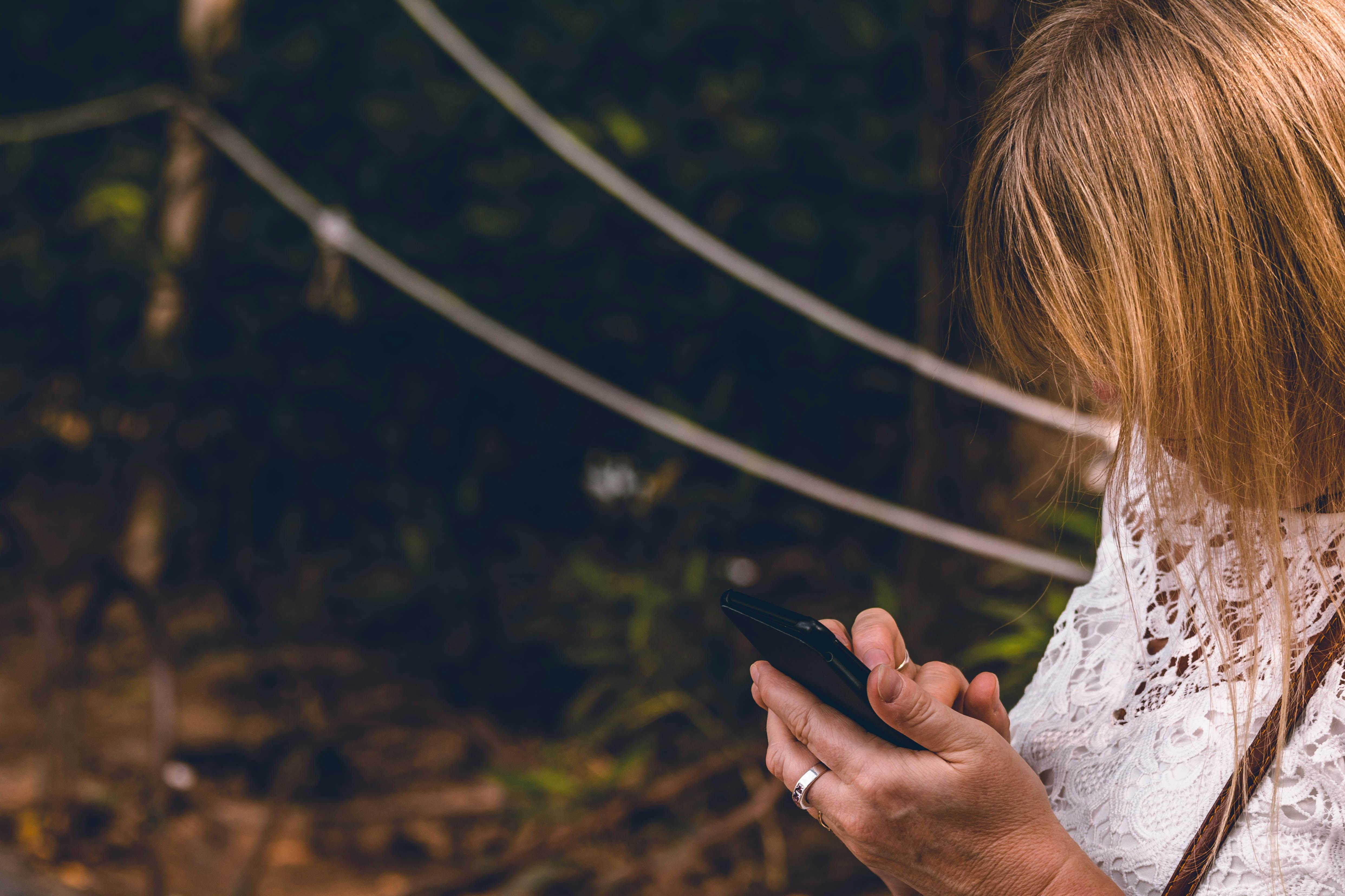 Woman Using Smartphone · Free Stock Photo