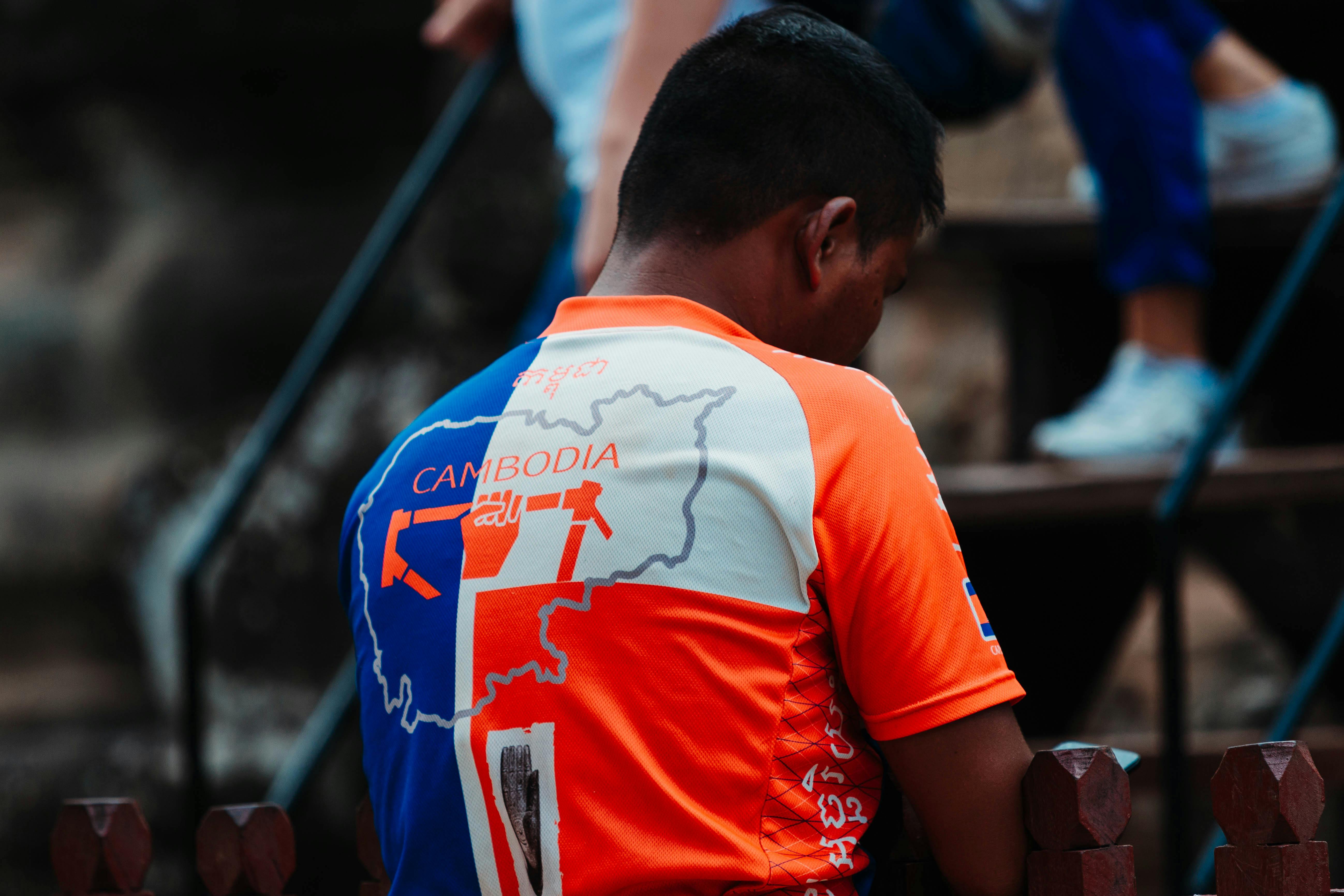Selective Focus Photography of Man Facing Computer · Free Stock Photo