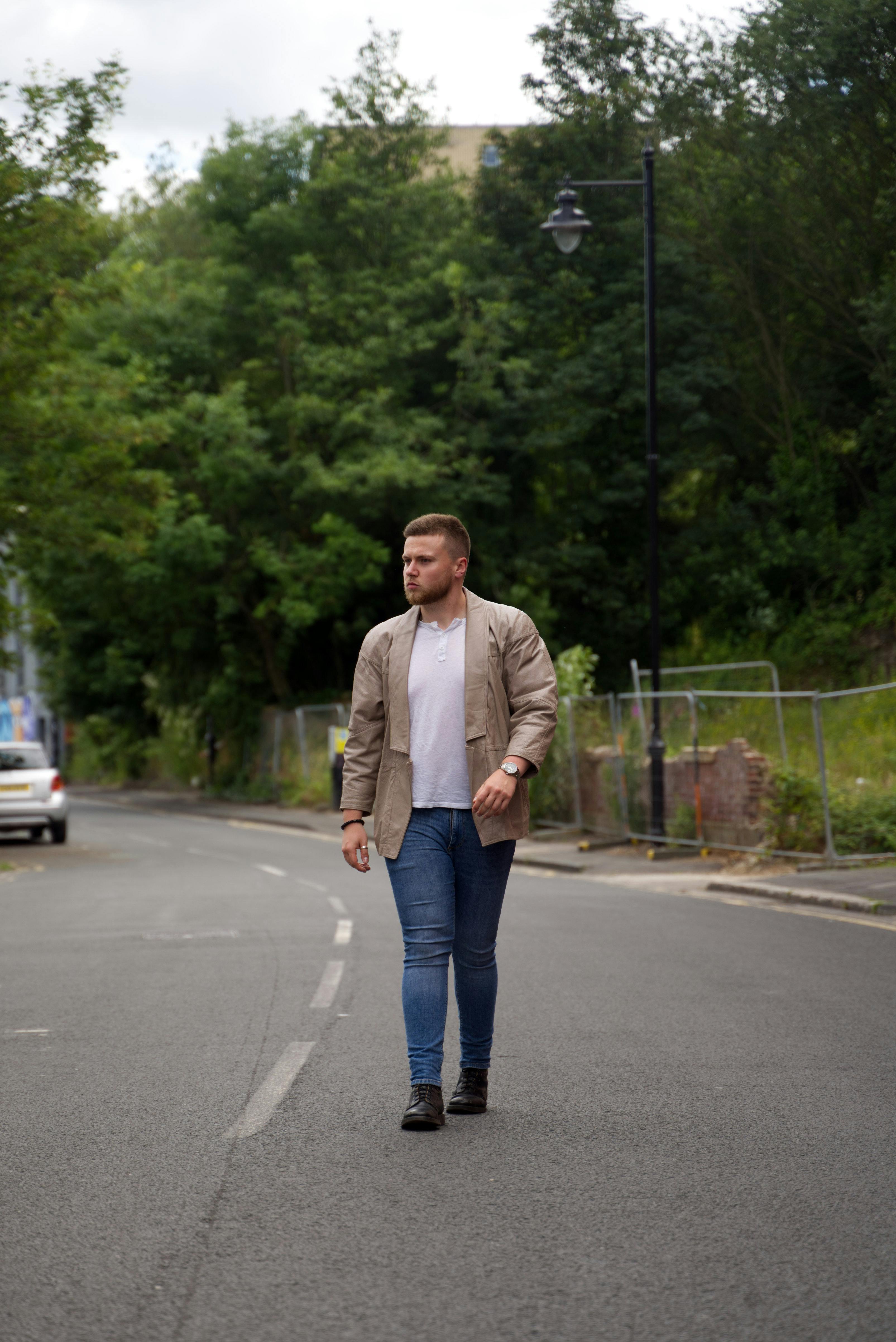 Urban Man Walking on City Street in Summer · Free Stock Photo