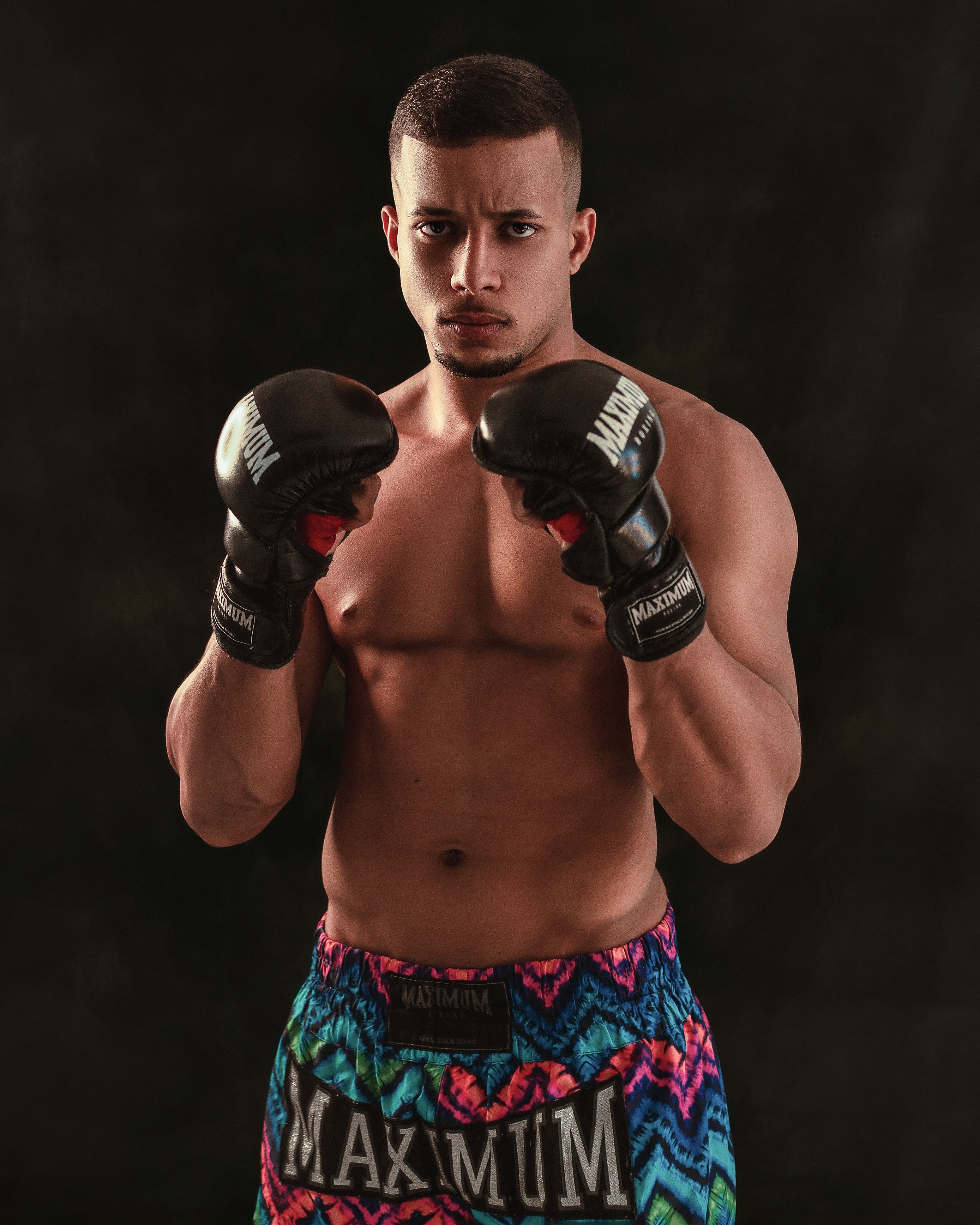 Boxer Standing in Ring with Belts · Free Stock Photo