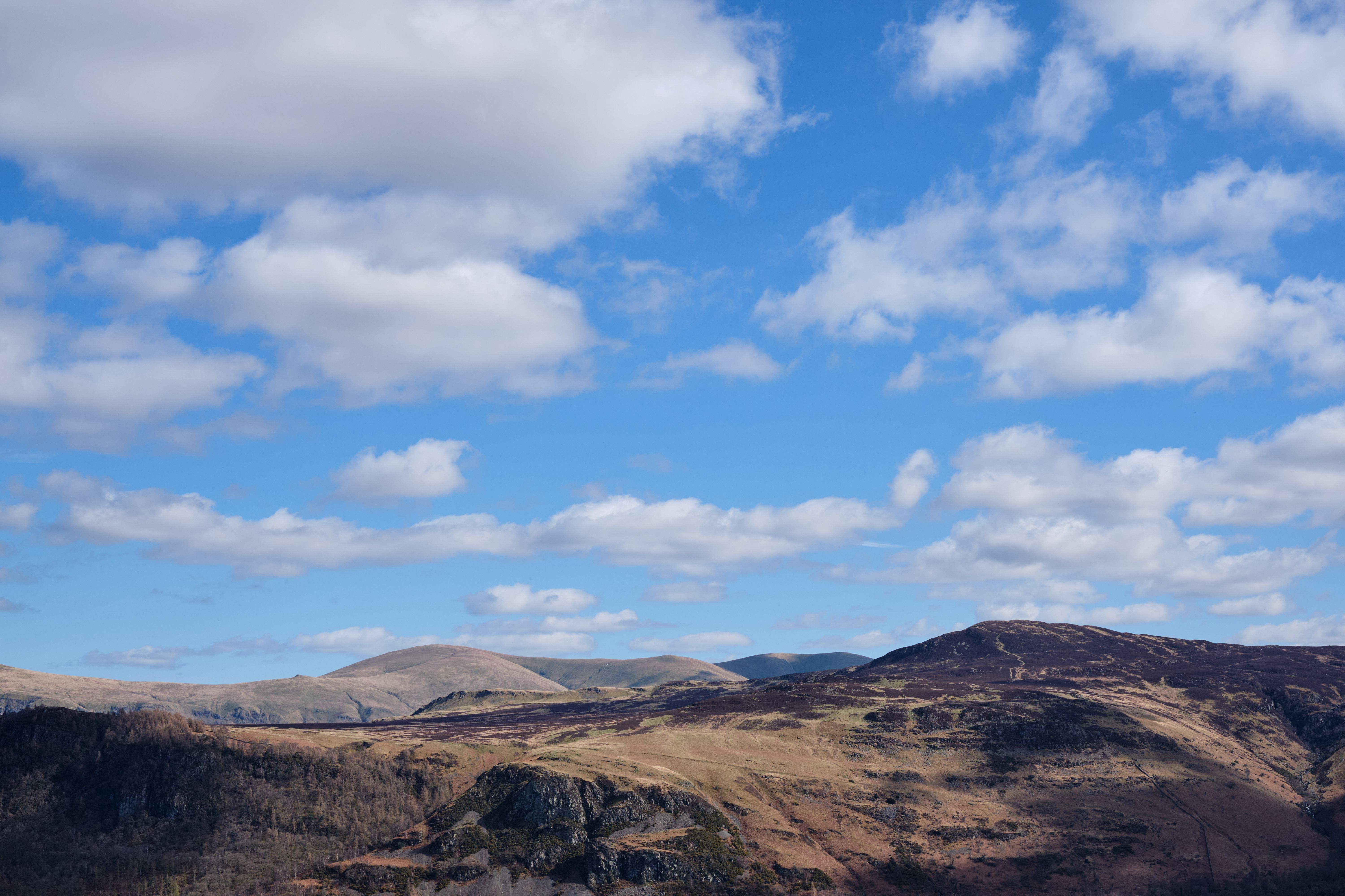 Sunlit Valley and Hills · Free Stock Photo