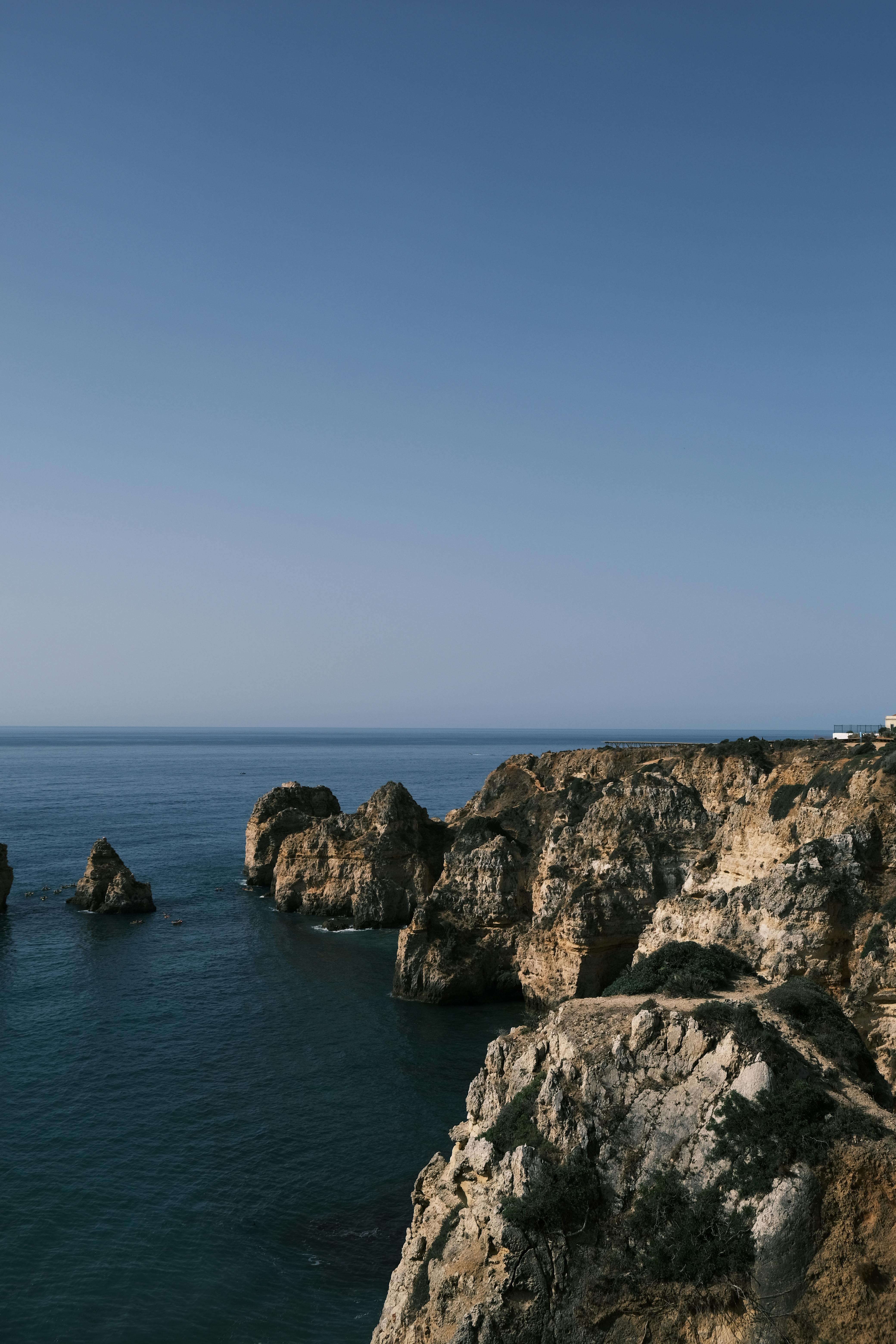 Placid Seascape with Rocky Cliffs at an Ocean Shore, Lagos, Portugal ...