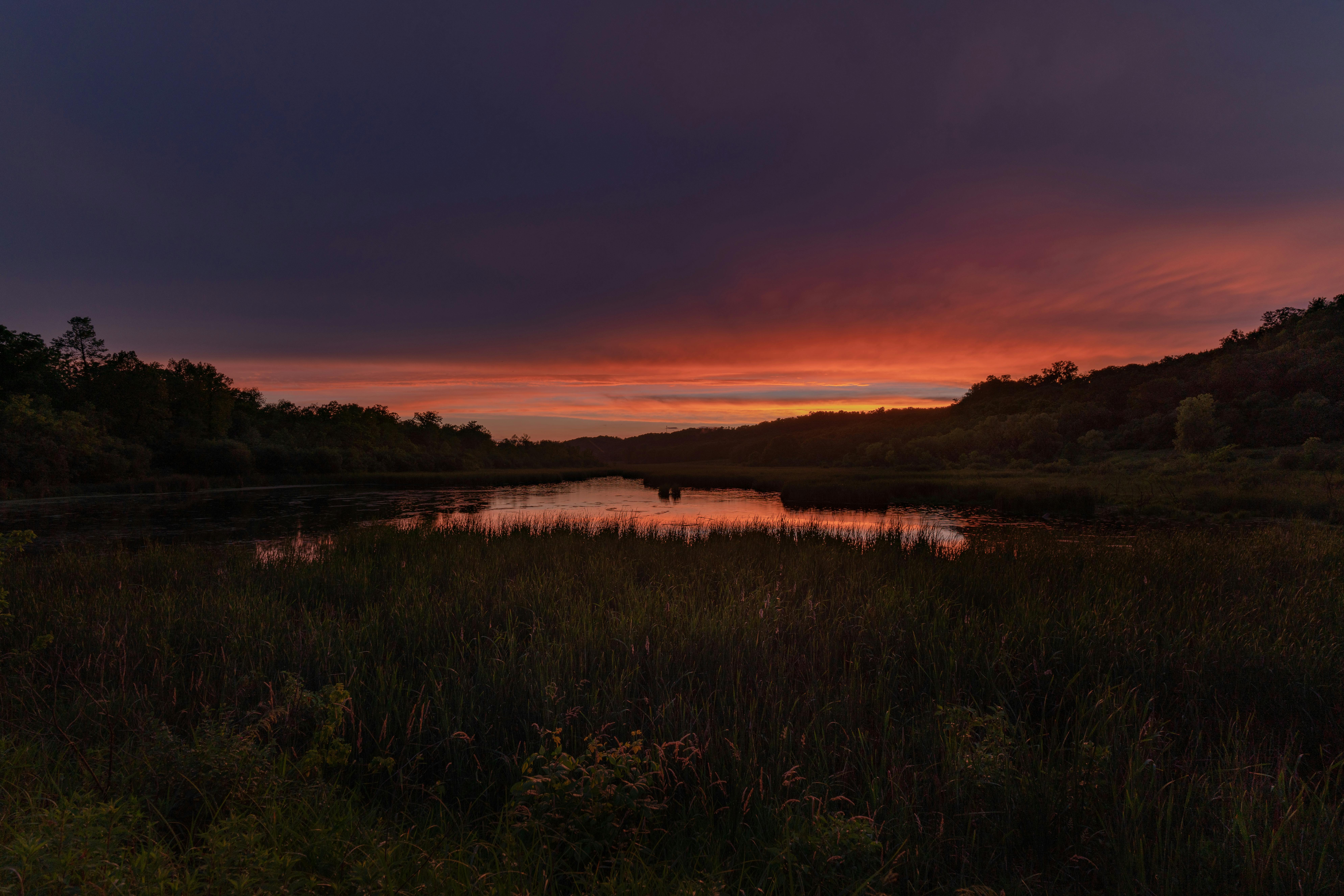 Rain Cloud over Lakeshore at Sunset · Free Stock Photo