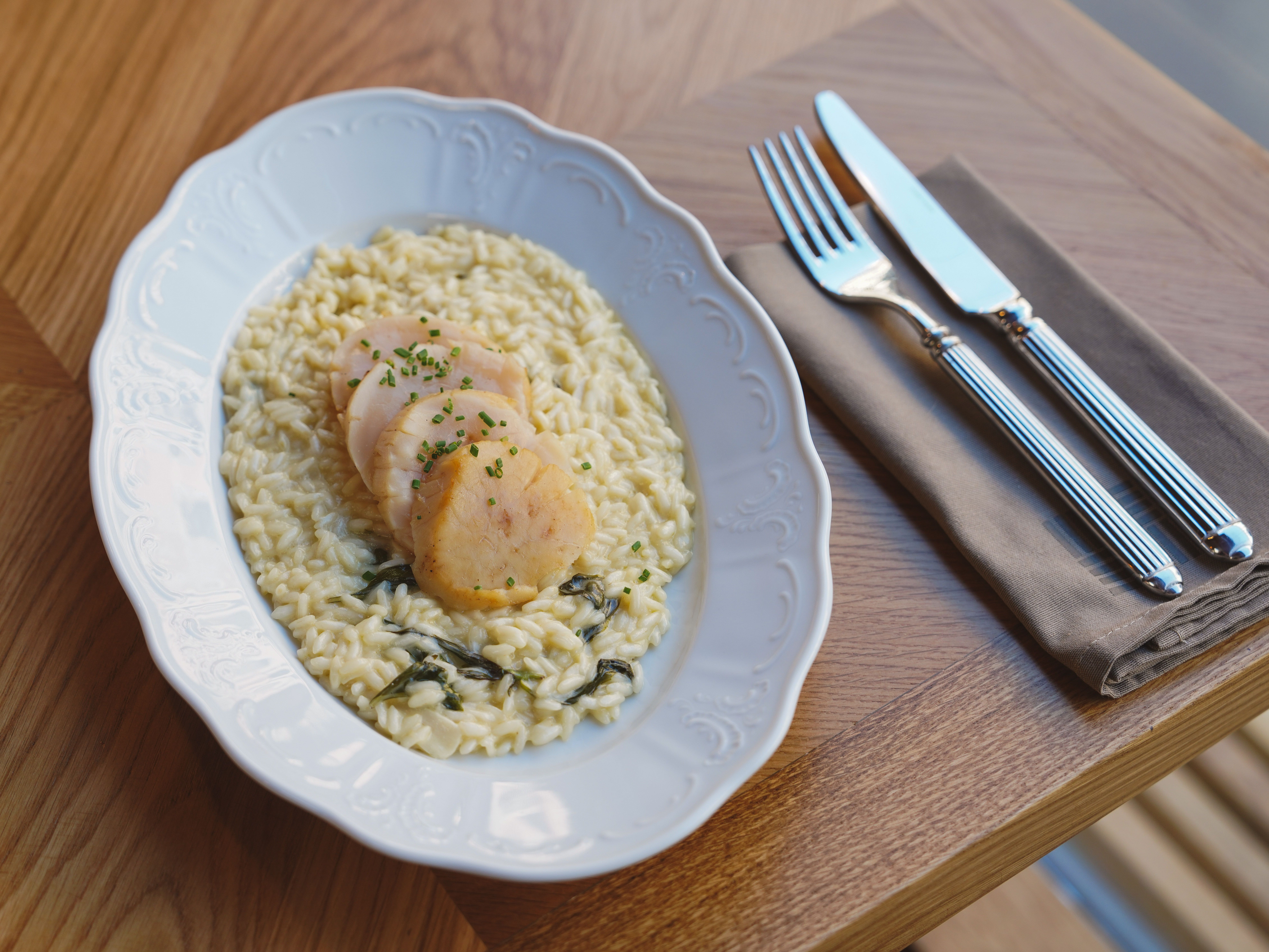 Risotto in Plate on Table · Free Stock Photo