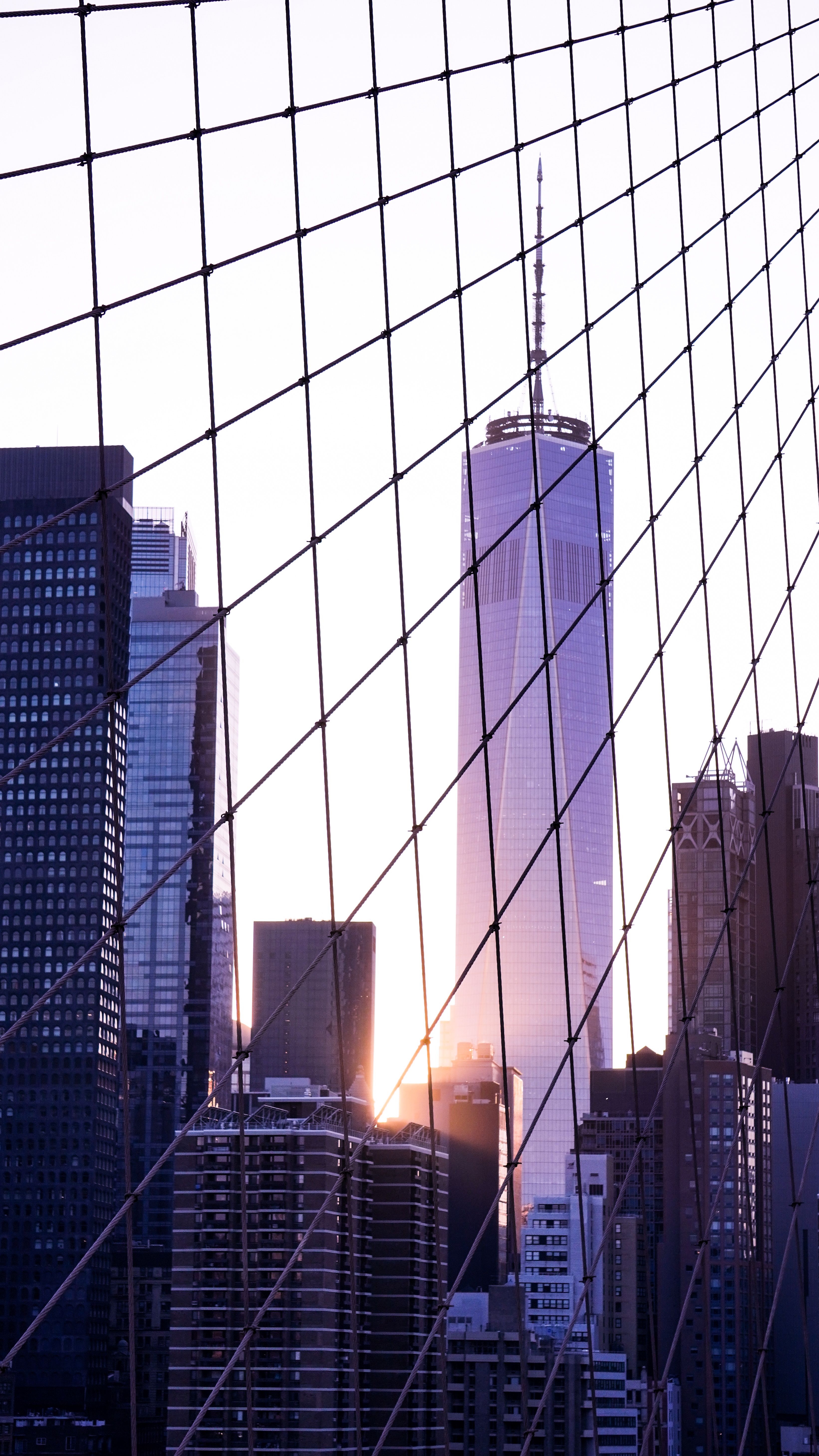 Skyscrapers Seen Through Cables of Brooklyn Bridge in New York City ...