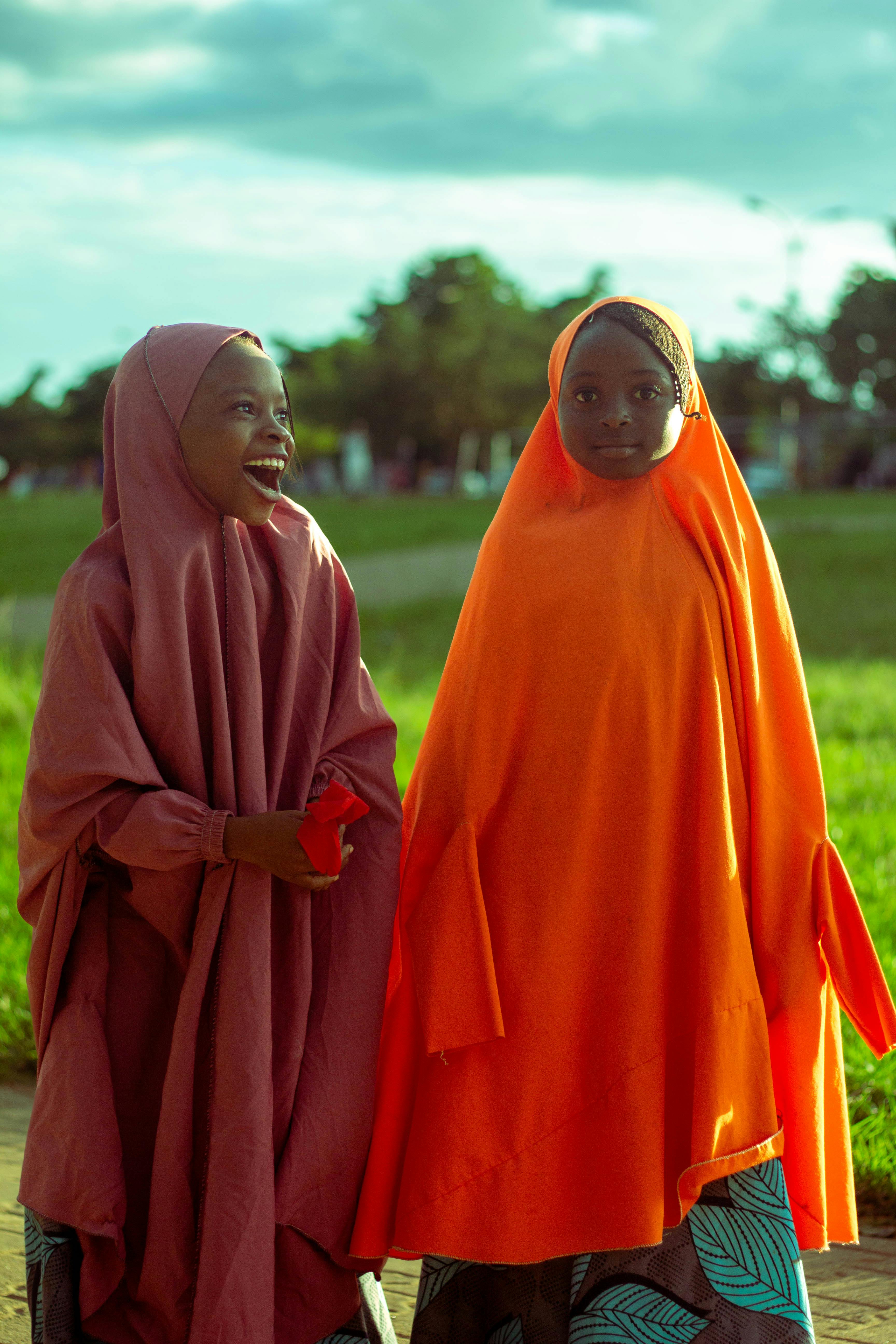 Women in Traditional Bright Colored Cloak · Free Stock Photo