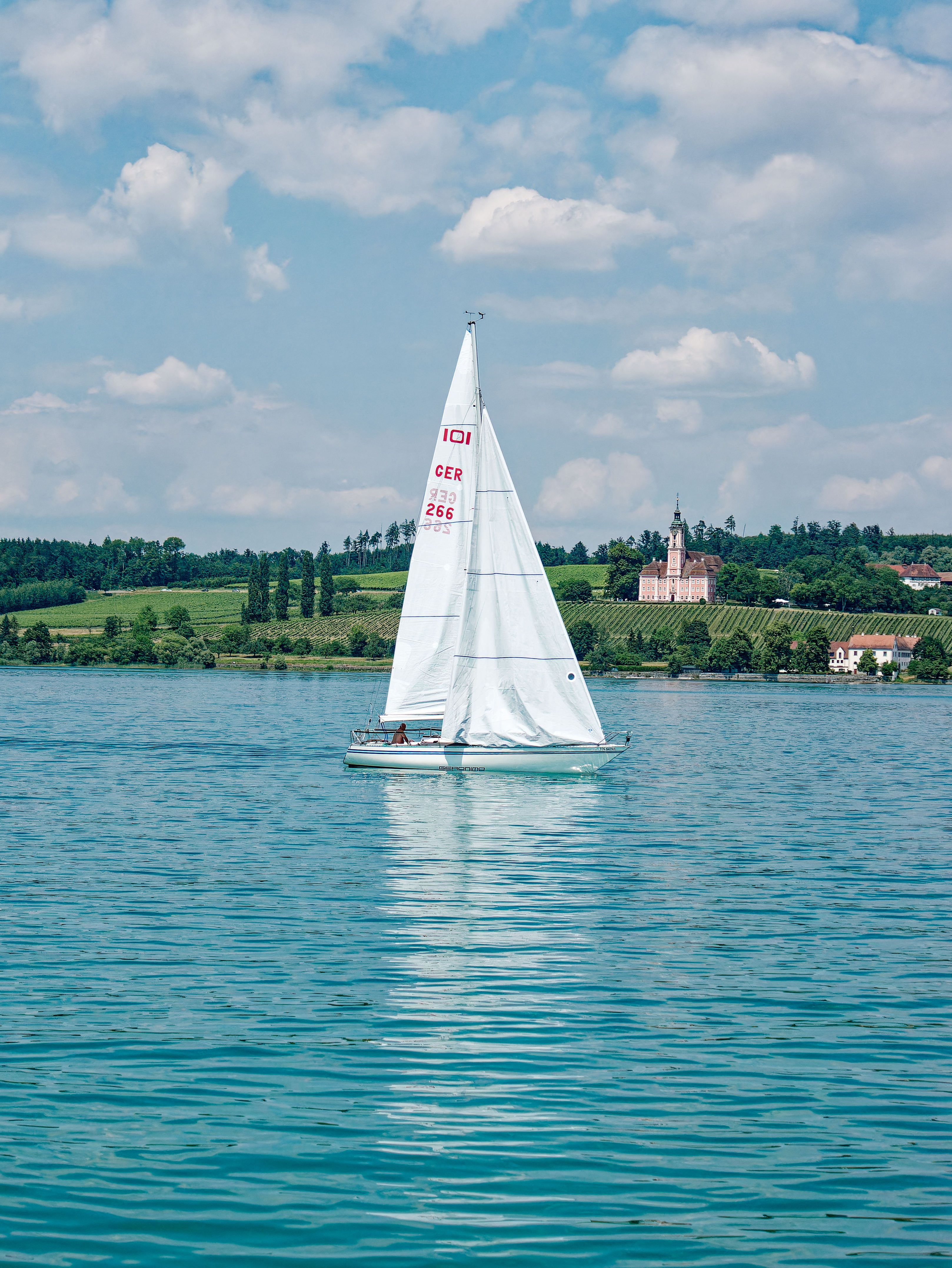 A Sailboat on the Lake with the View of the Birnau Church in the ...