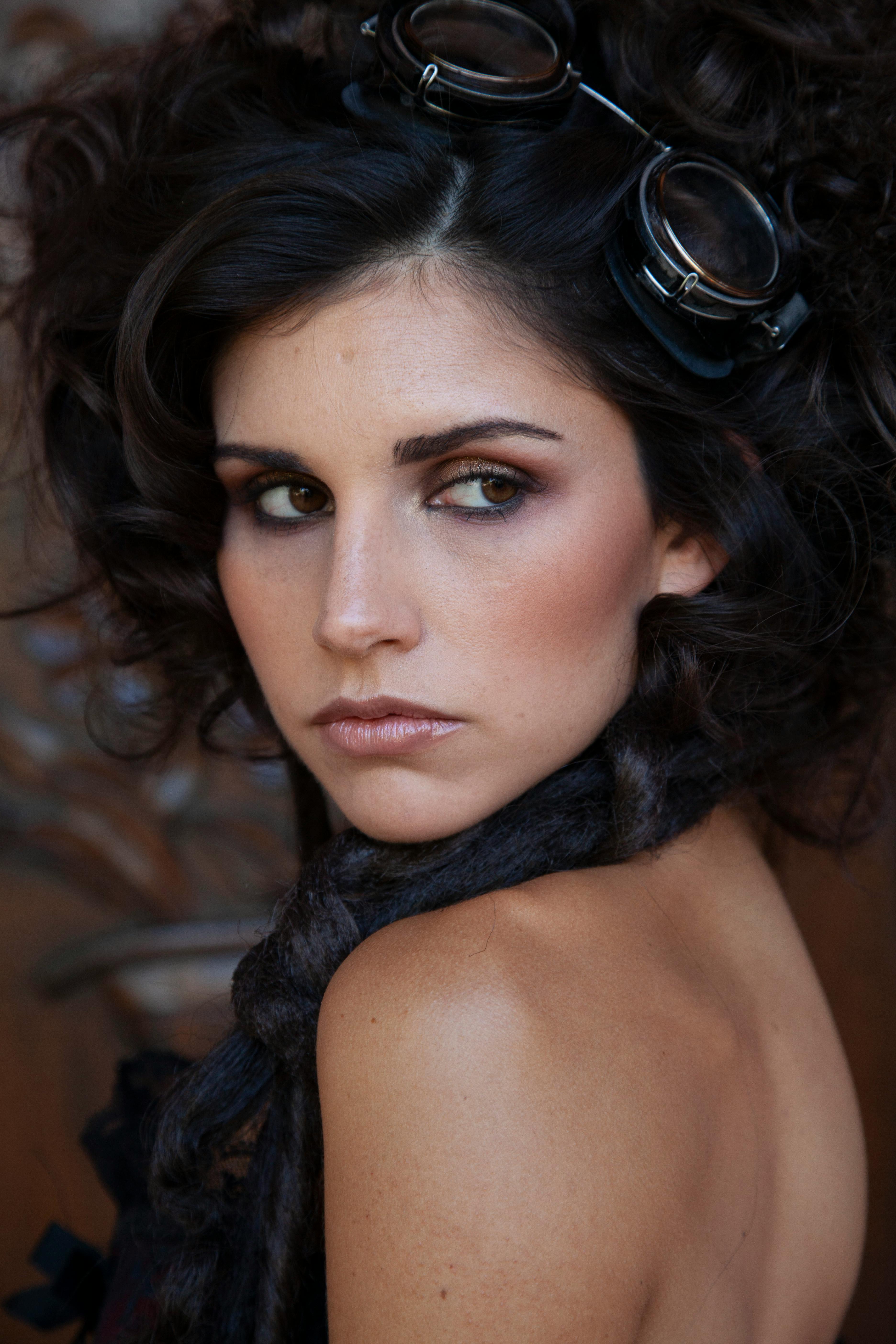 Pretty Woman with Goggles on Her Head · Free Stock Photo