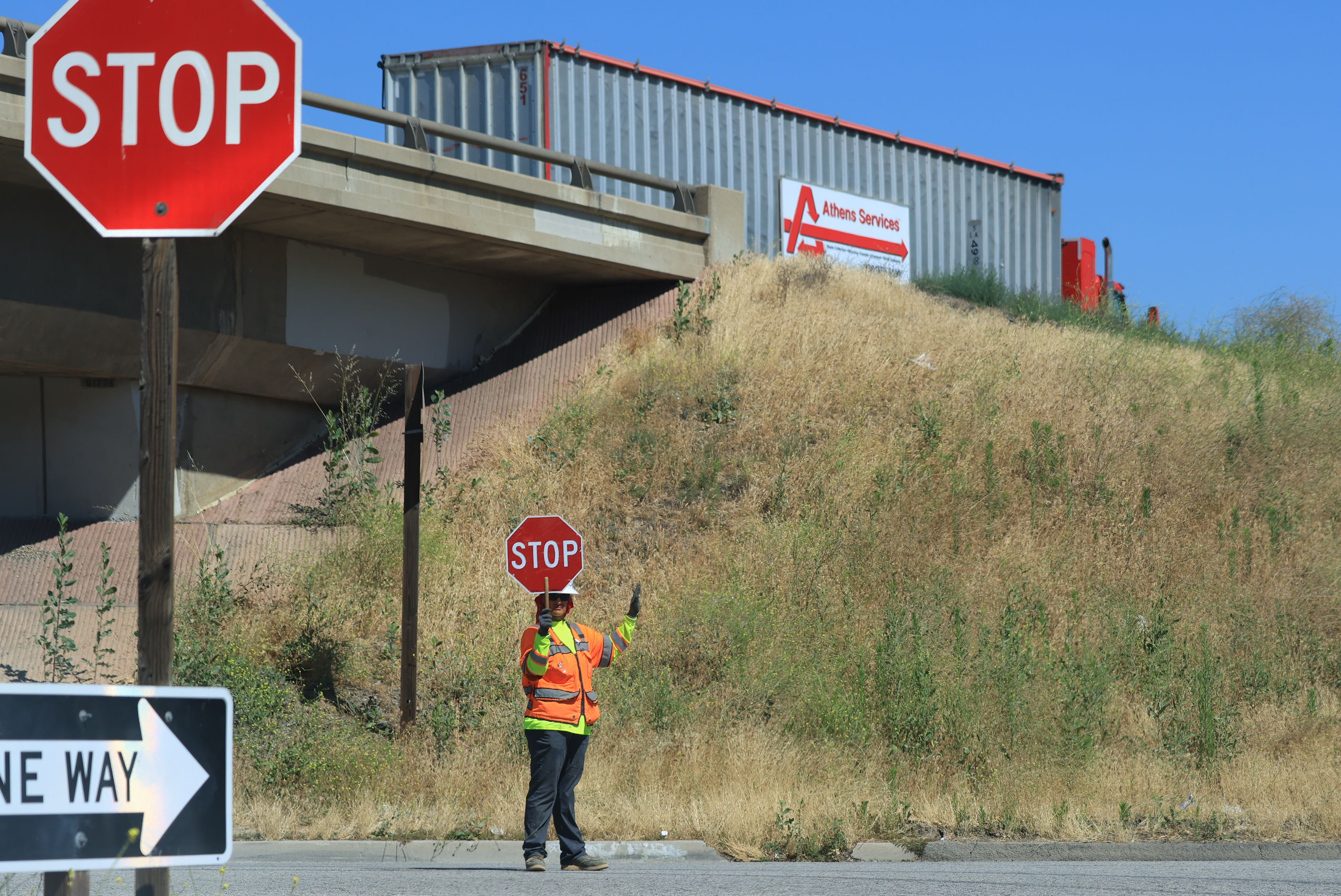 Person Holding Stop Sign · Free Stock Photo