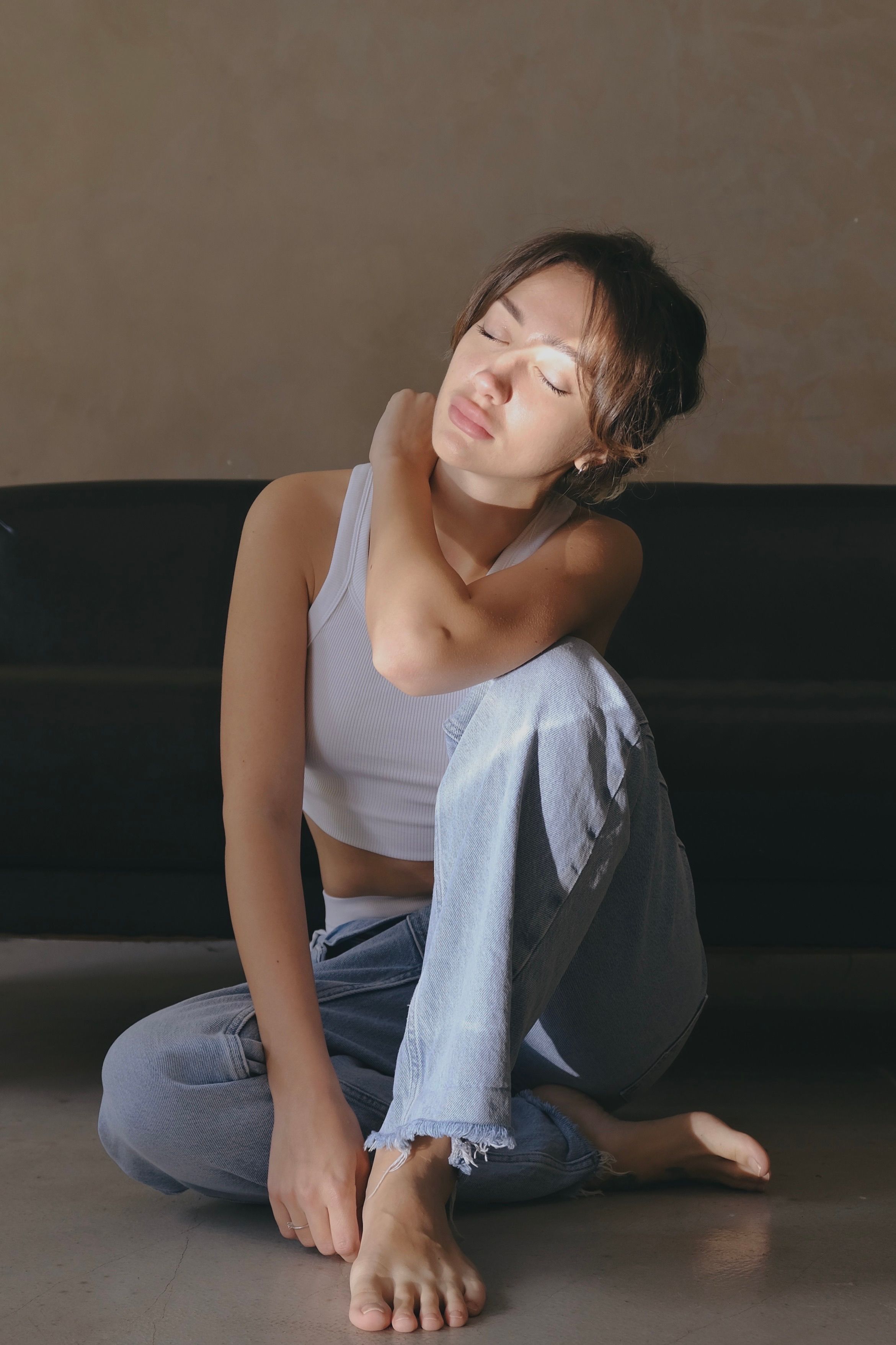 Woman in Jeans Sitting · Free Stock Photo