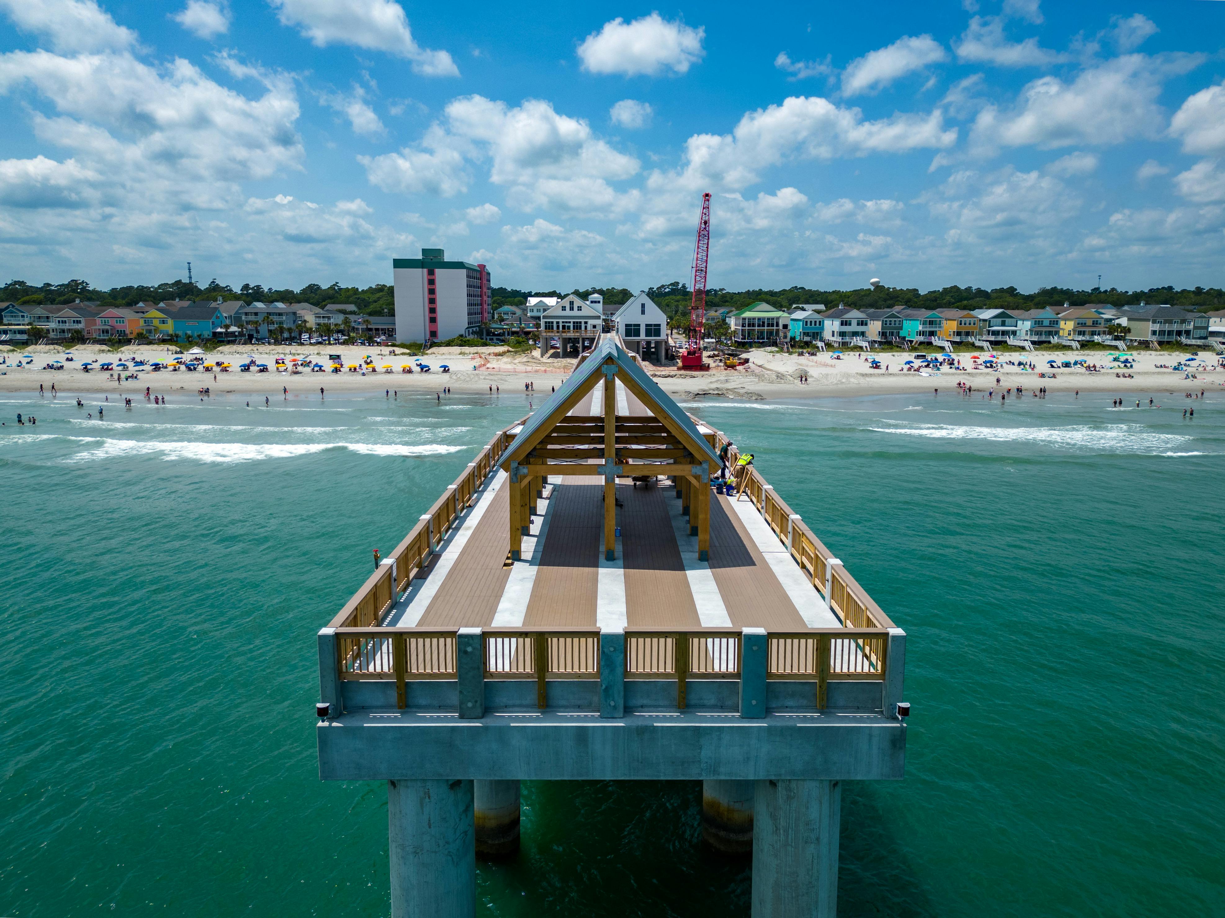 Surfside Beach Fishing Pier and Tourists on the Beach · Free Stock Photo