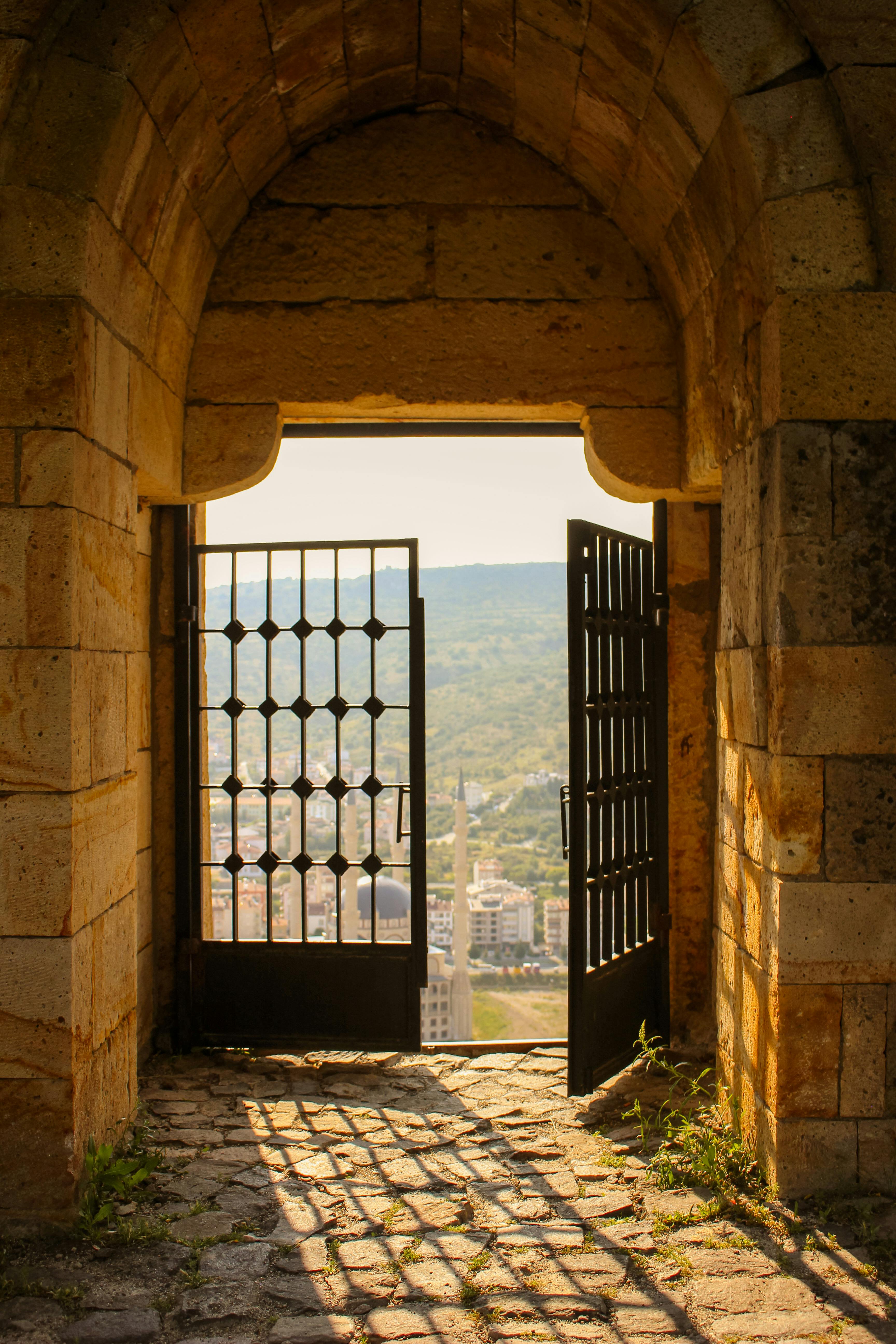 Opened Gate in Arch · Free Stock Photo