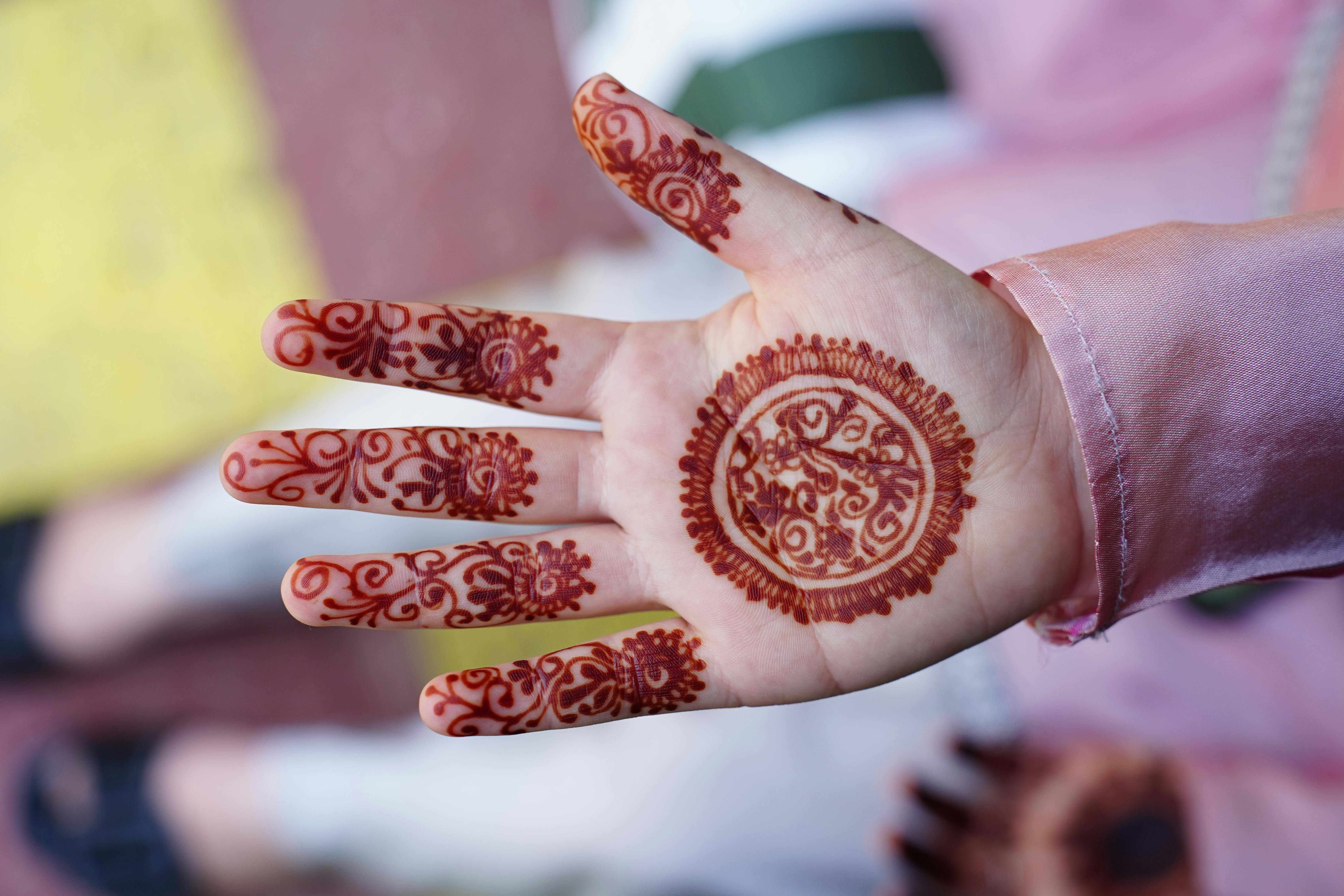 Traditional Floral Design Henna Tattoo on a Woman's Hand · Free Stock Photo