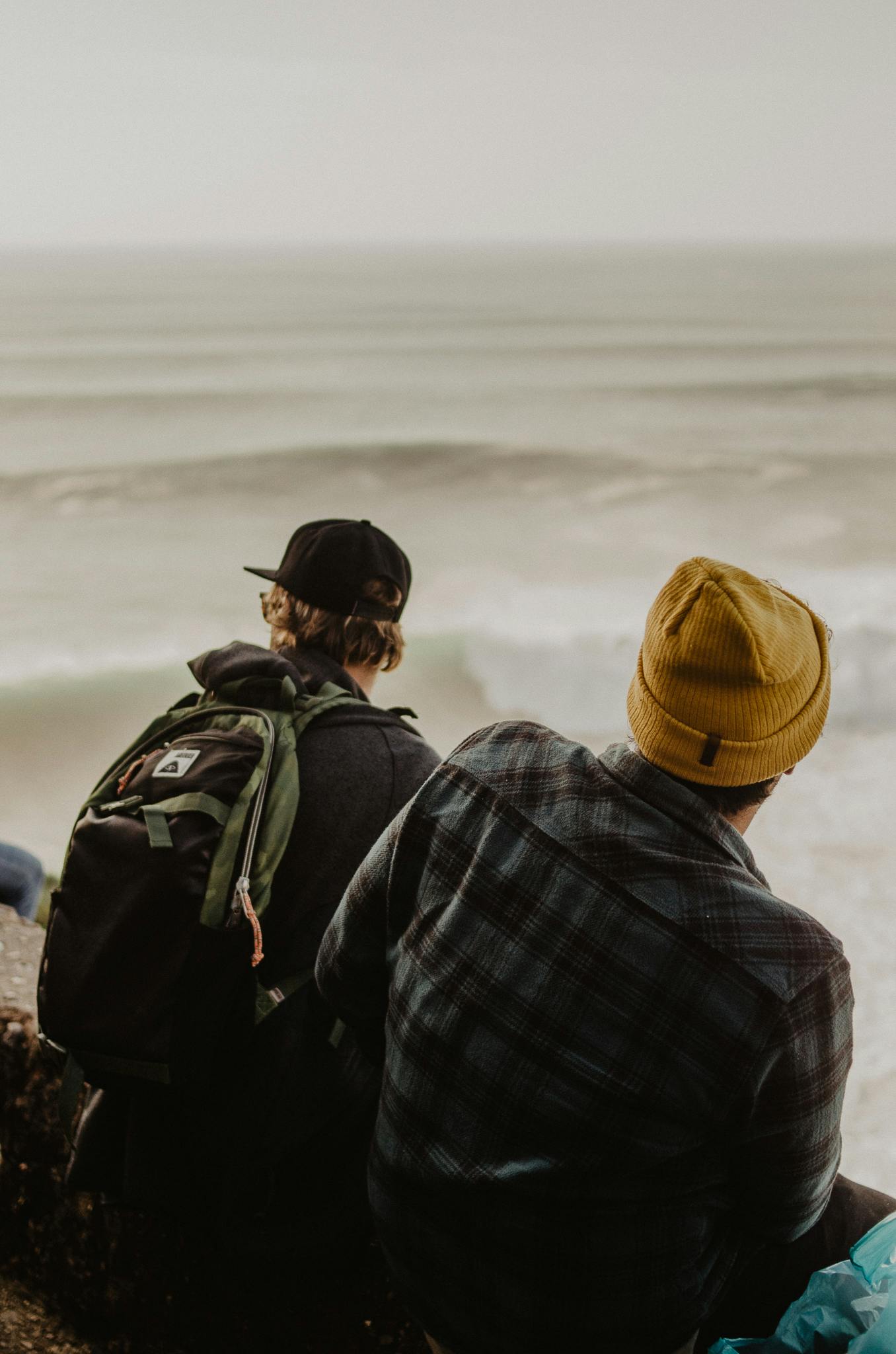 A Person Sitting in Mountains · Free Stock Photo