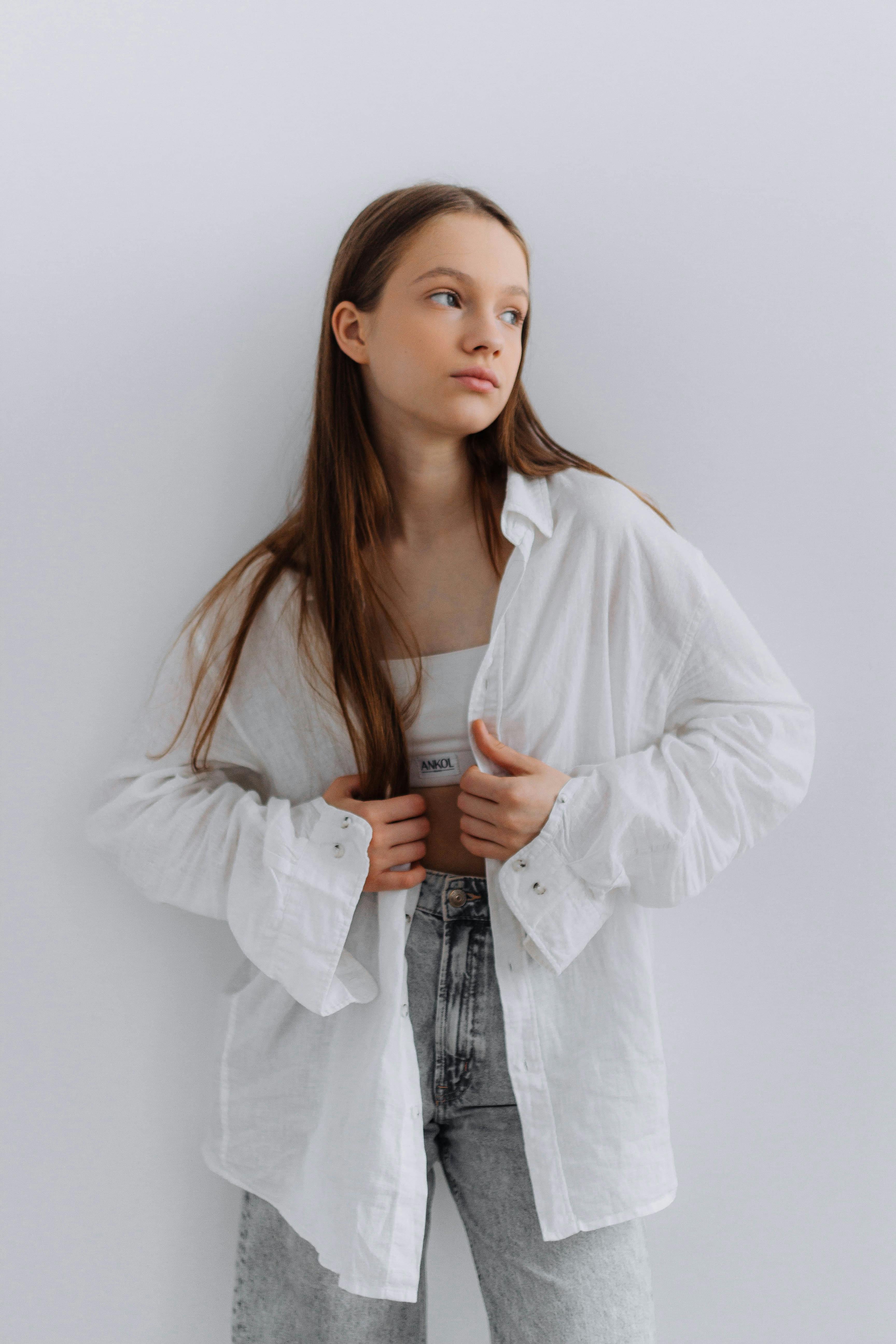 Studio Shot of a Young Girl in a Simple Trendy Outfit · Free Stock Photo