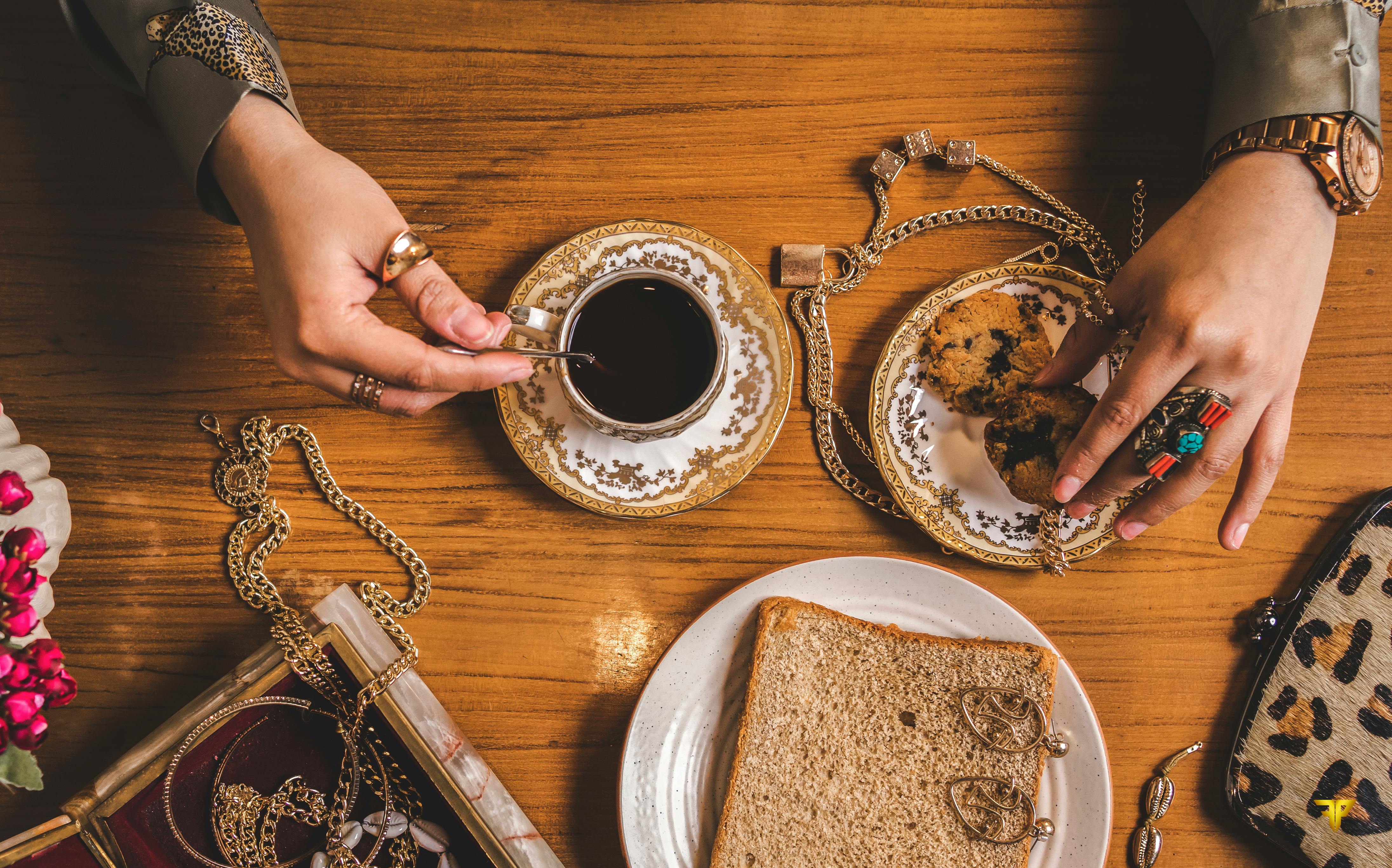 Woman Hands over Cookie and Coffee · Free Stock Photo