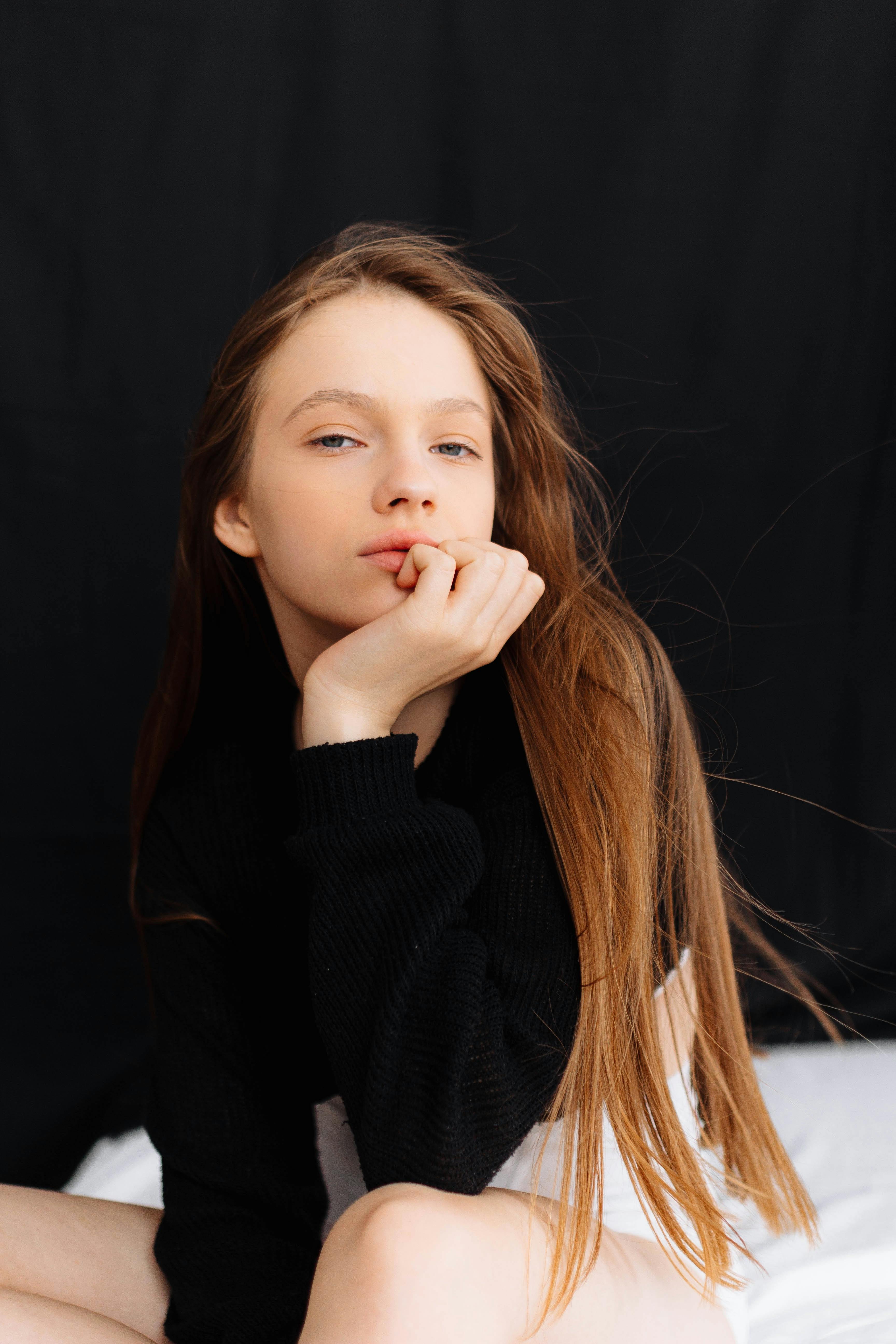 Teenage Model in Black Sweater · Free Stock Photo