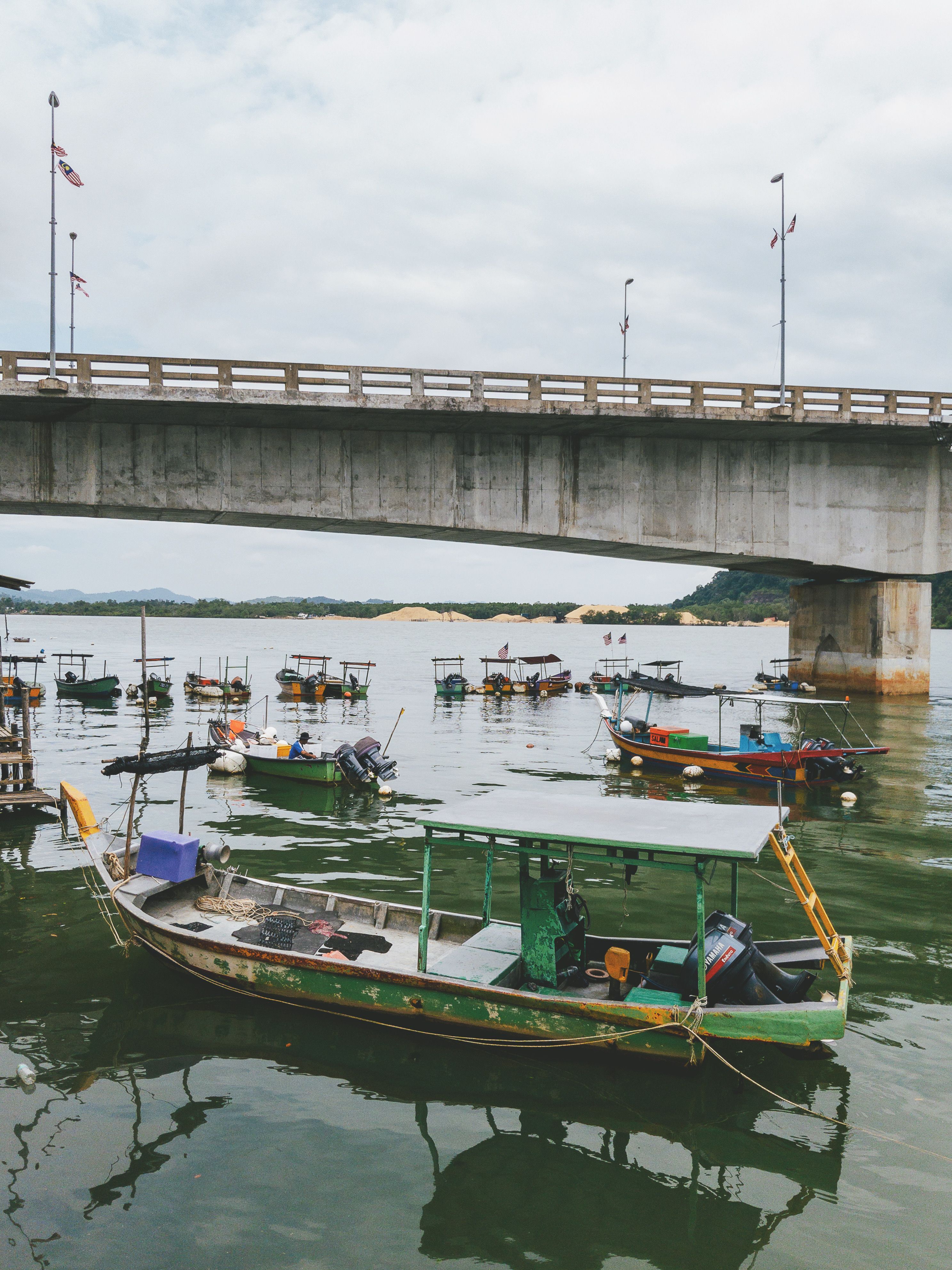 View of Boats Moored near a Bridge · Free Stock Photo