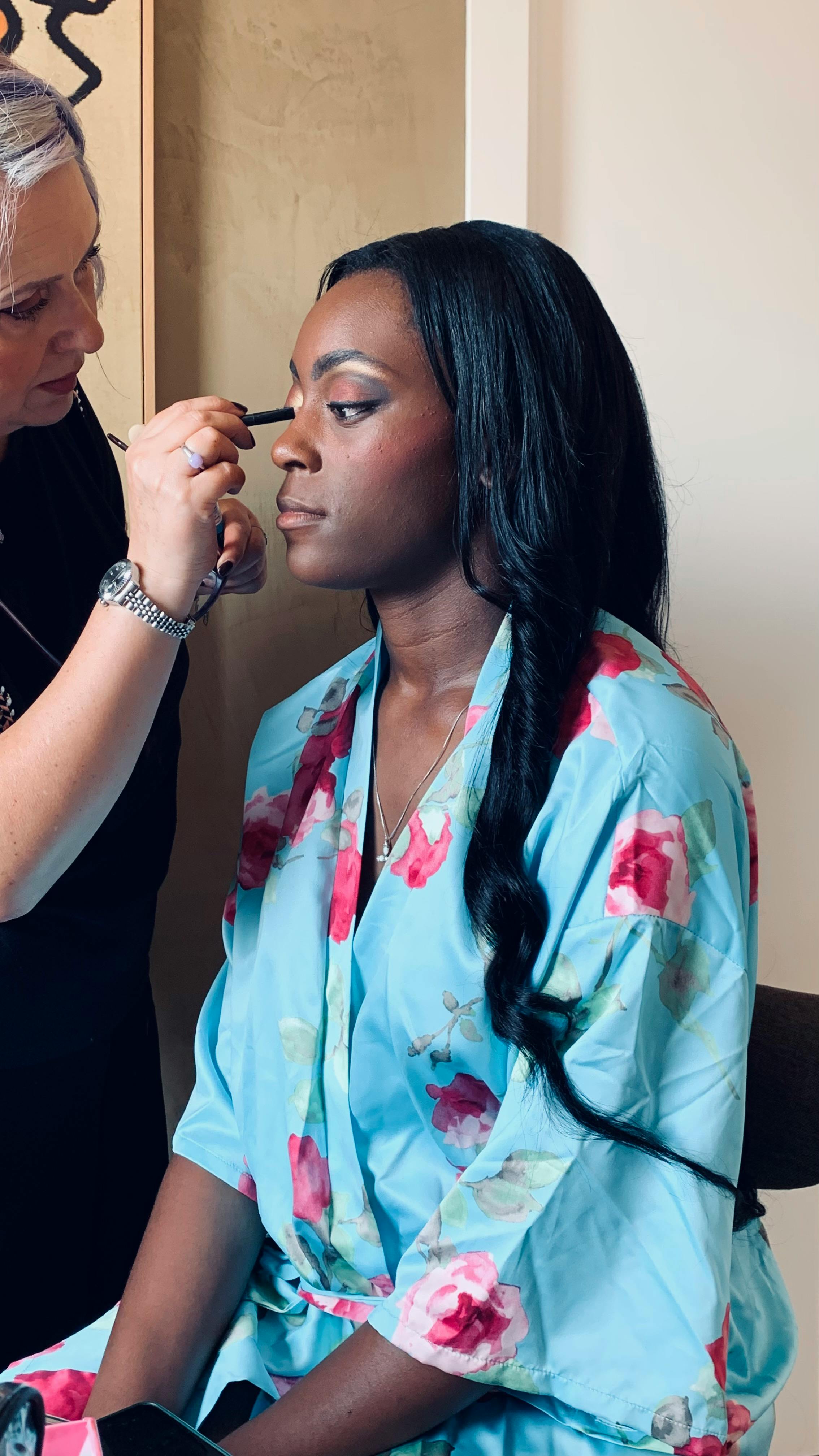 Woman Getting Her Makeup Done · Free Stock Photo