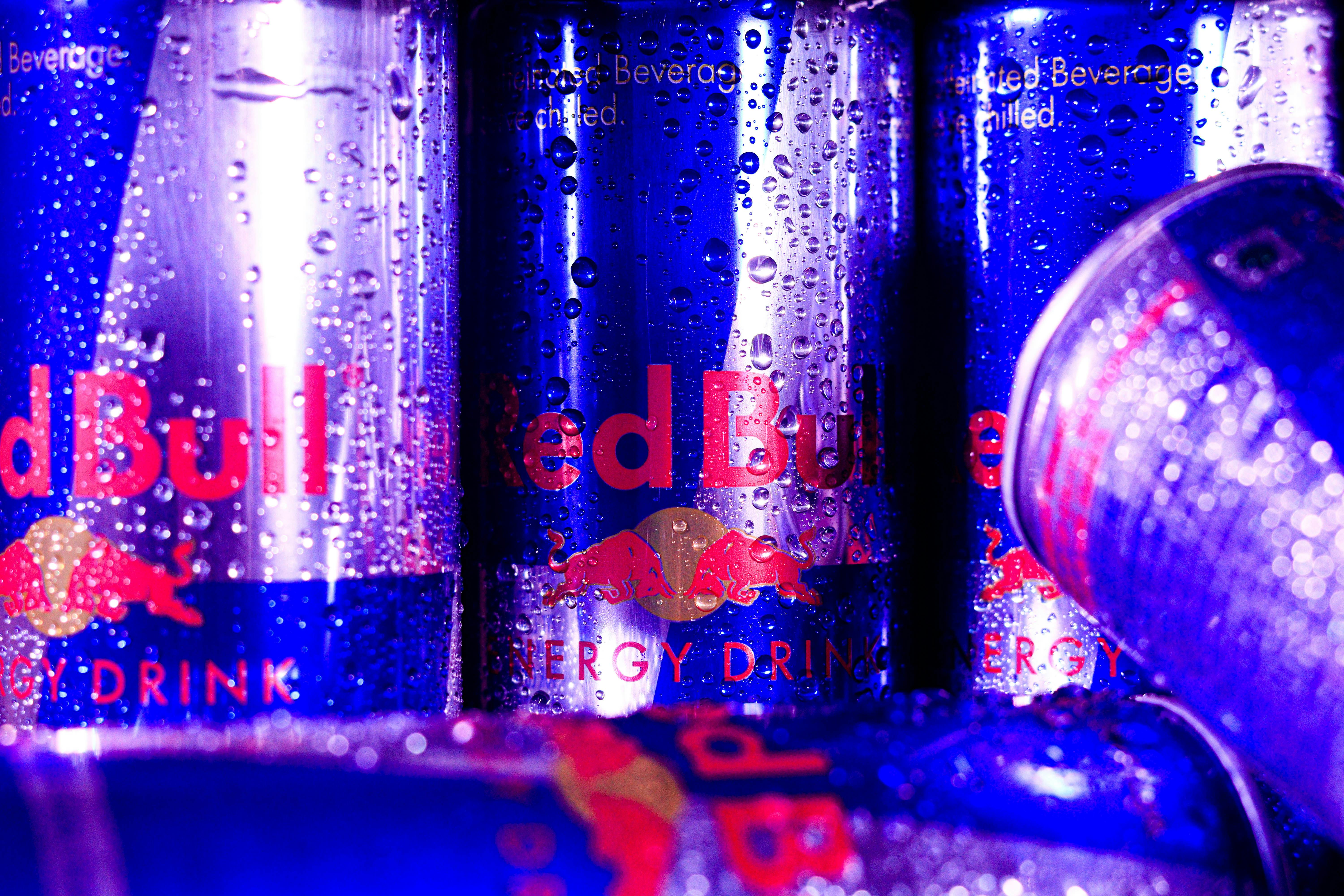 Red Bull Energy Drink Cans in Close Up Shot · Free Stock Photo