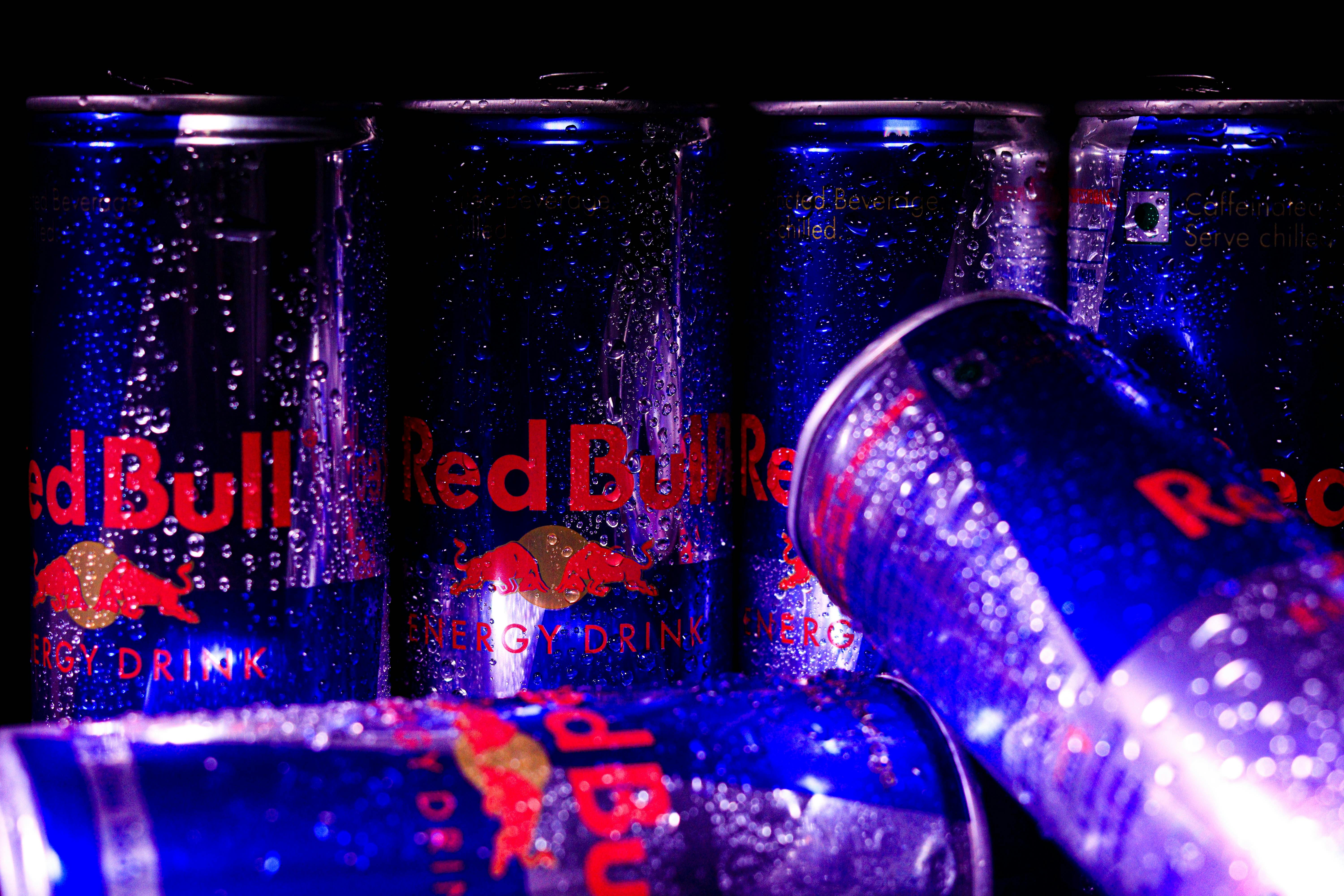 Red Bull Energy Drink Cans in Close Up Shot · Free Stock Photo